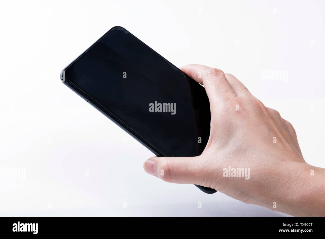 Hand-held cell phone Stock Photo - Alamy