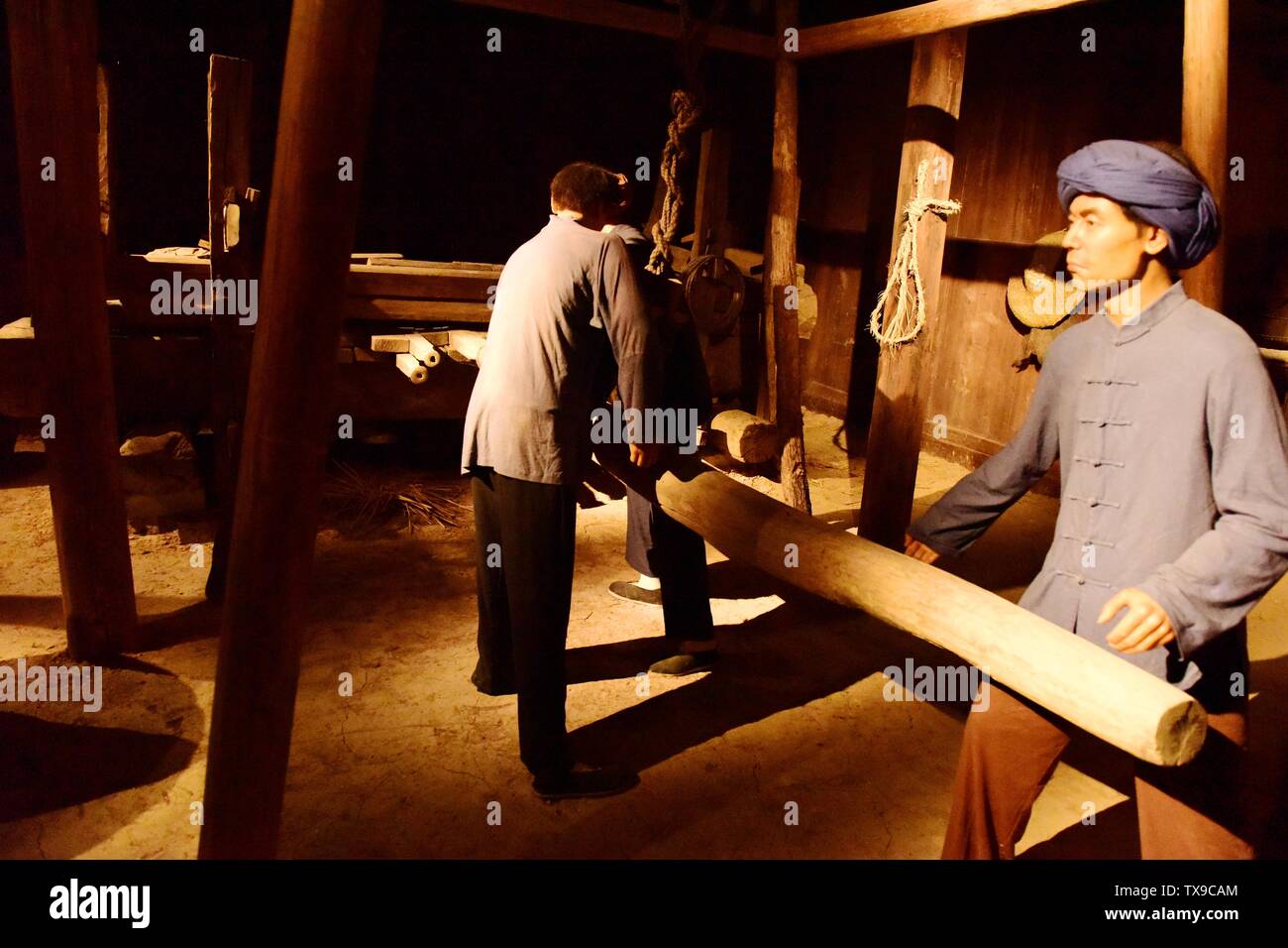 The ancient method of extracting oil Stock Photo - Alamy