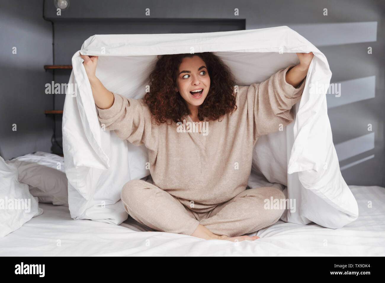 Woman wrapped in sheet hi-res stock photography and images - Alamy