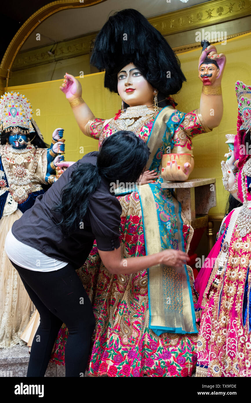 As part of a thanks giving ritual, a devout woman designed and ...