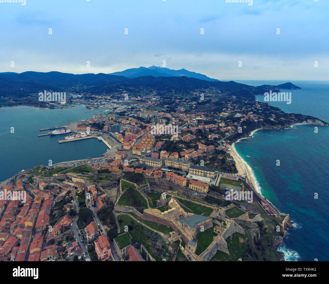 The landscape of Elba island, Italy. Aerial view of the Fort, pier and ...