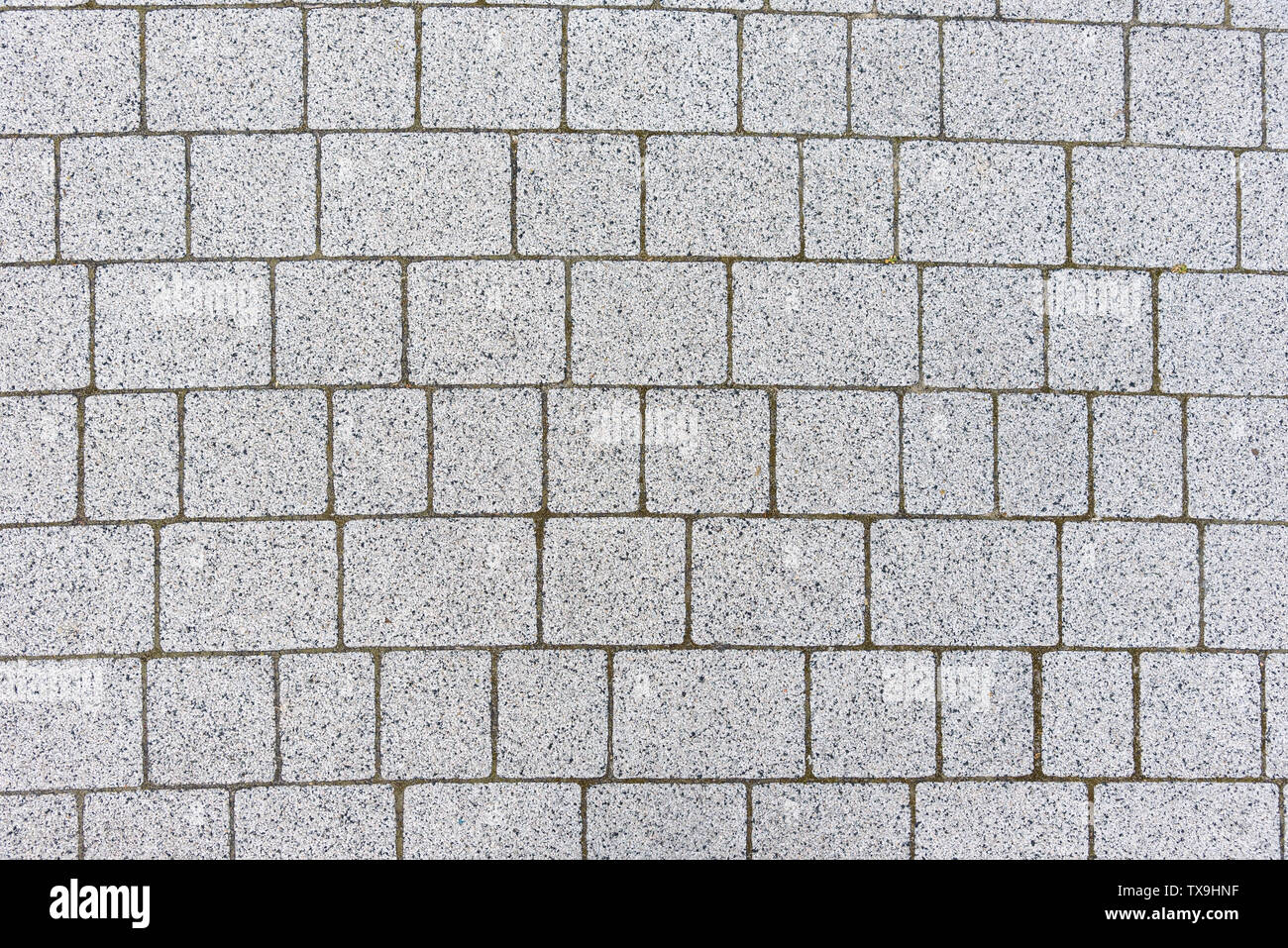 Gray sett bricks - texture or background, pavement Stock Photo - Alamy