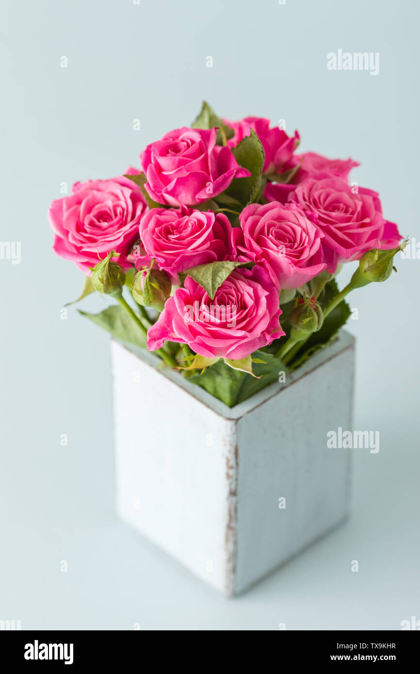 Beautiful bouquet of fresh pink roses in retro shabby chic vase on ...