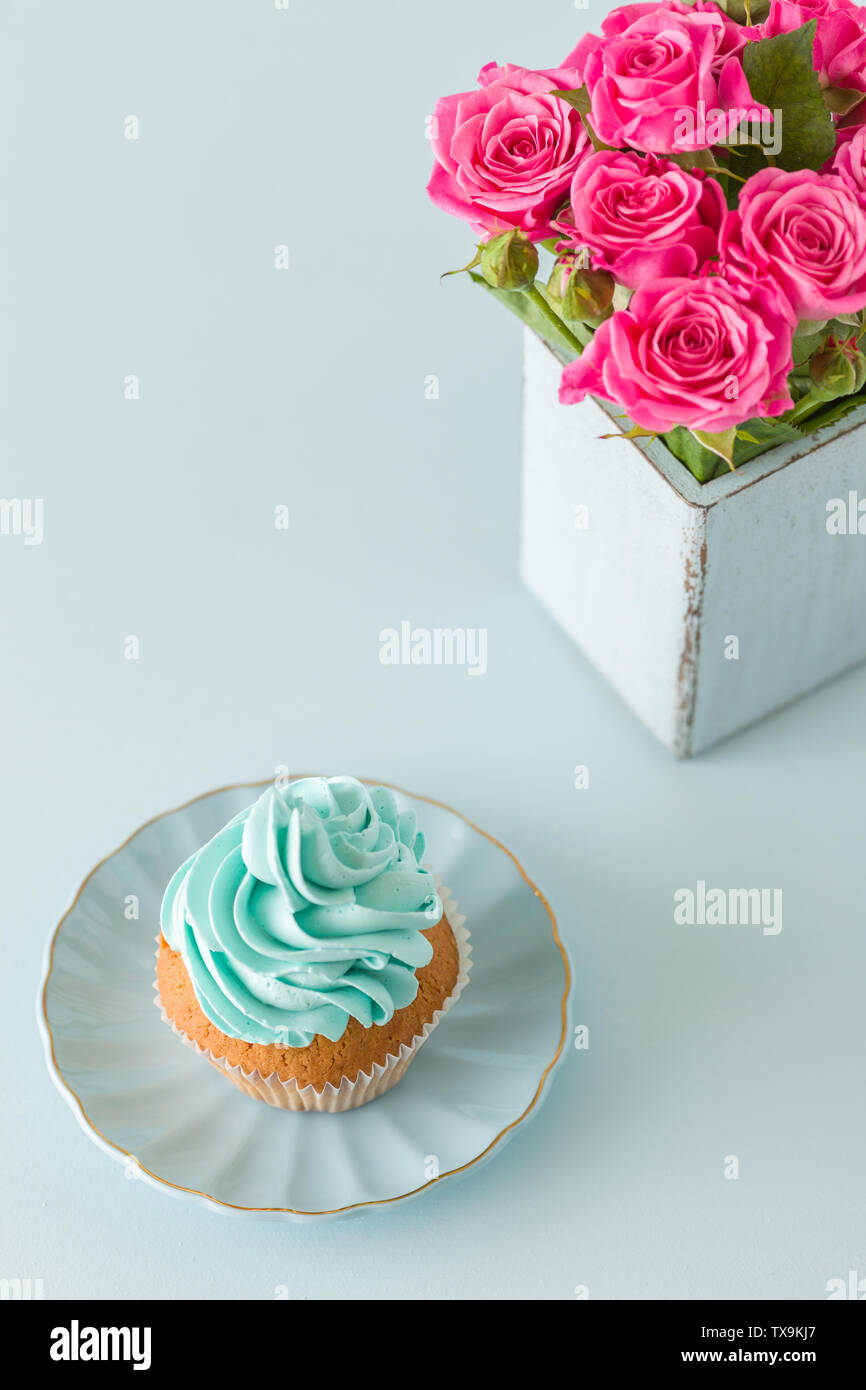 Blue pastel vertical banner with top view of decorated with blue cream ...