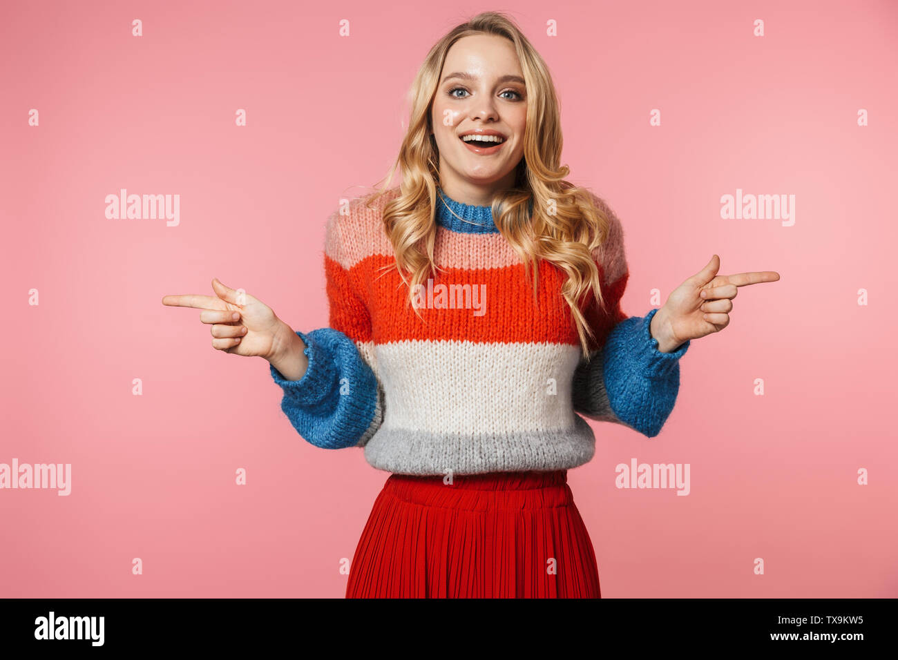Image of a happy excited young pretty beautiful woman posing isolated ...
