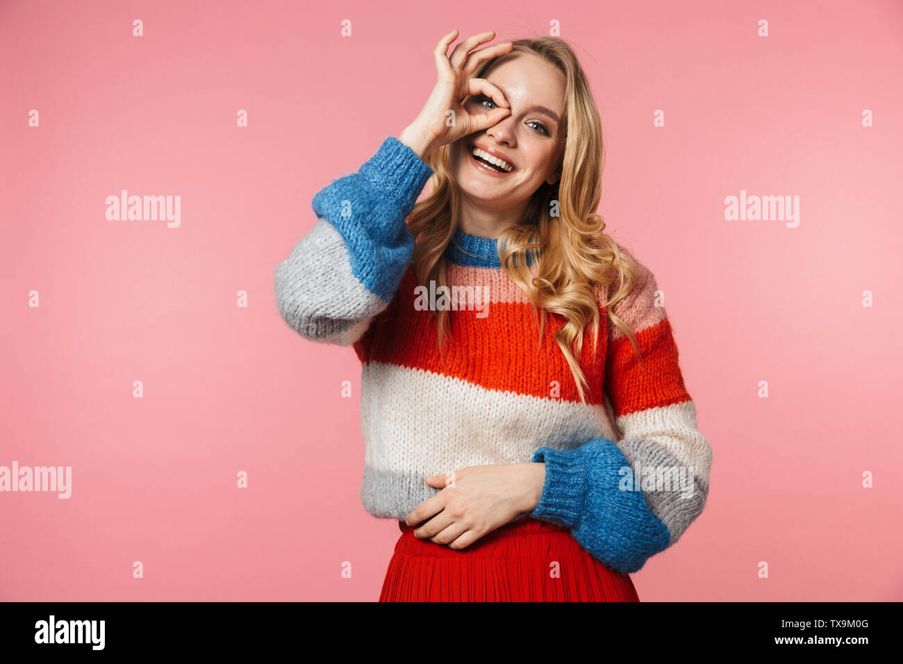 Image of a happy excited young pretty beautiful woman posing isolated ...