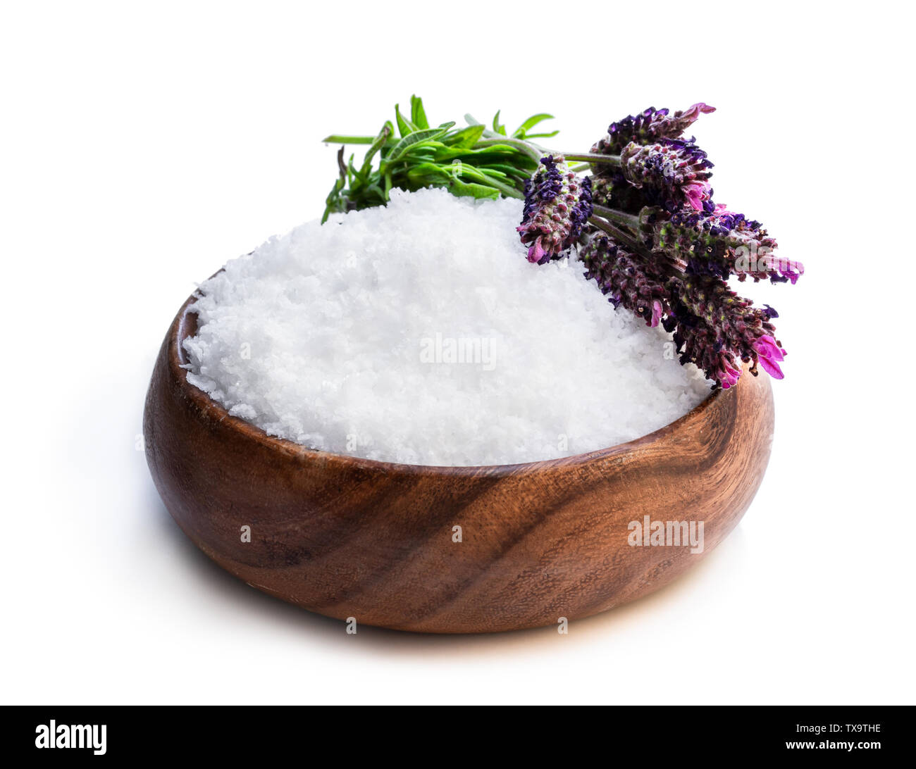 Lavender salt in wooden bowl isolated on white Stock Photo - Alamy