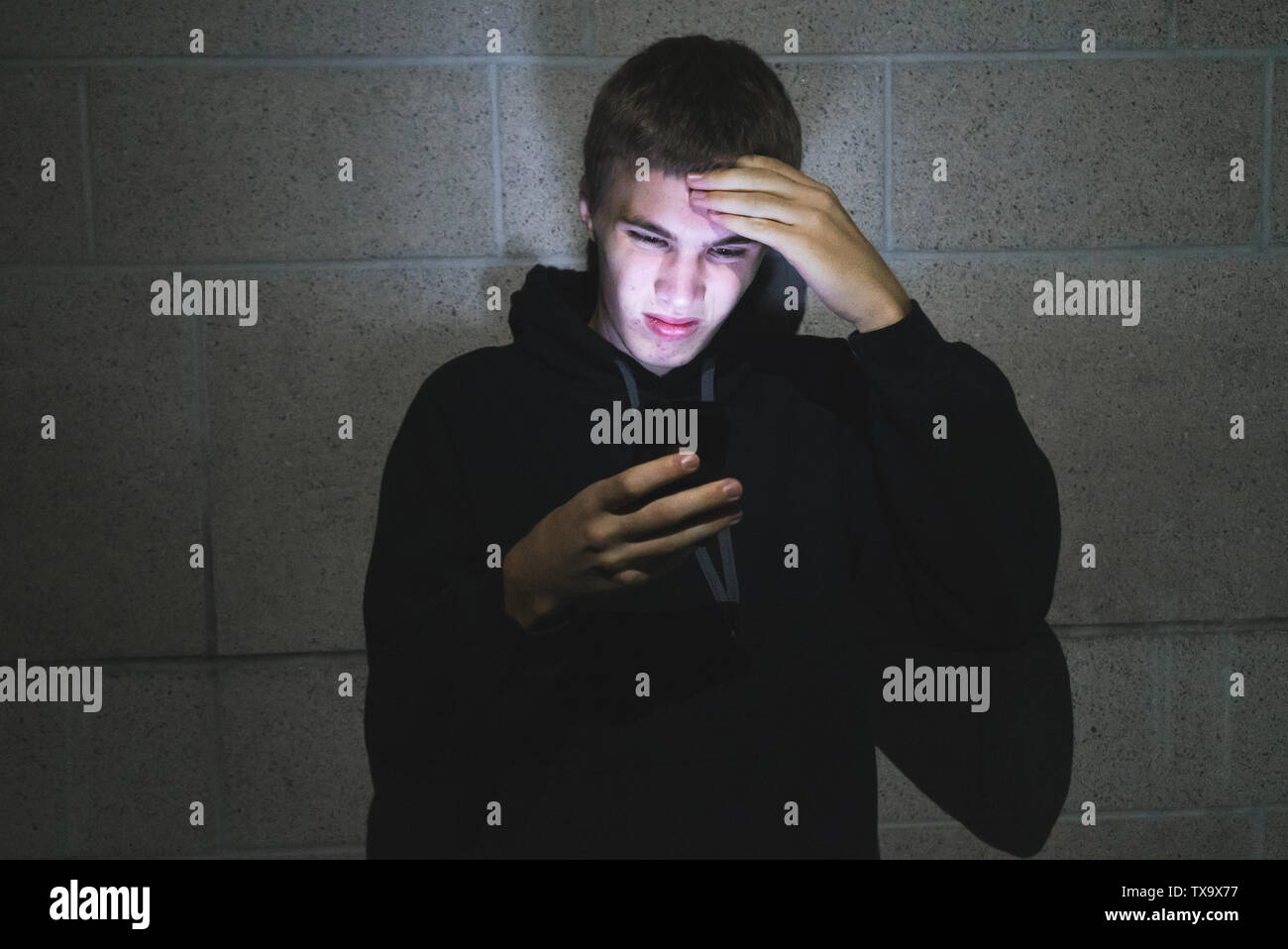 Sad teenager social media hi-res stock photography and images - Alamy