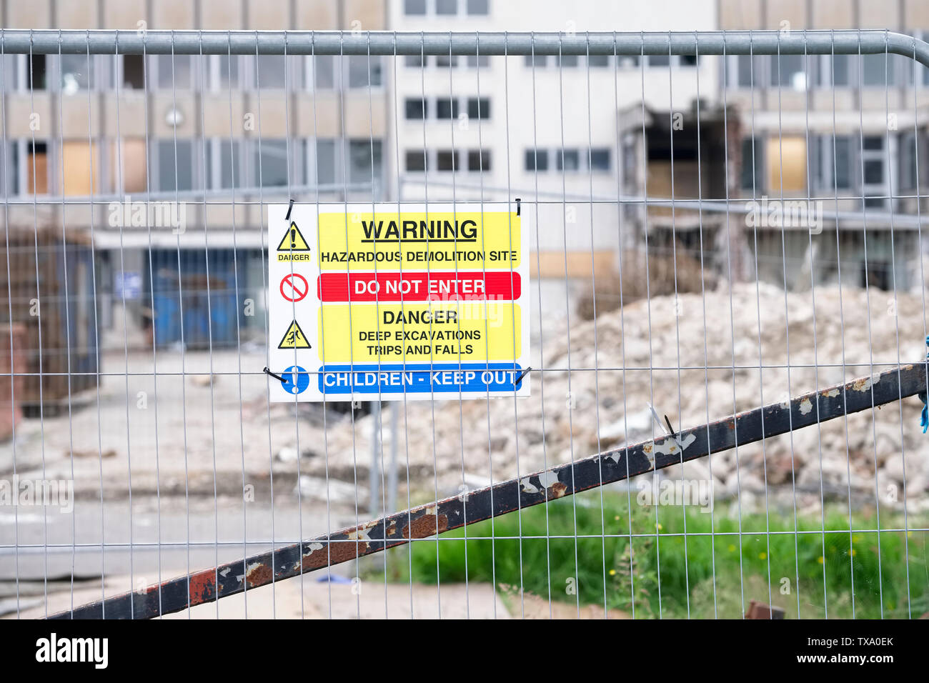 Demolition site building collapse hazard danger sign Stock Photo - Alamy