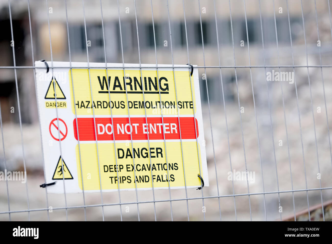 Demolition site building collapse hazard danger sign Stock Photo - Alamy