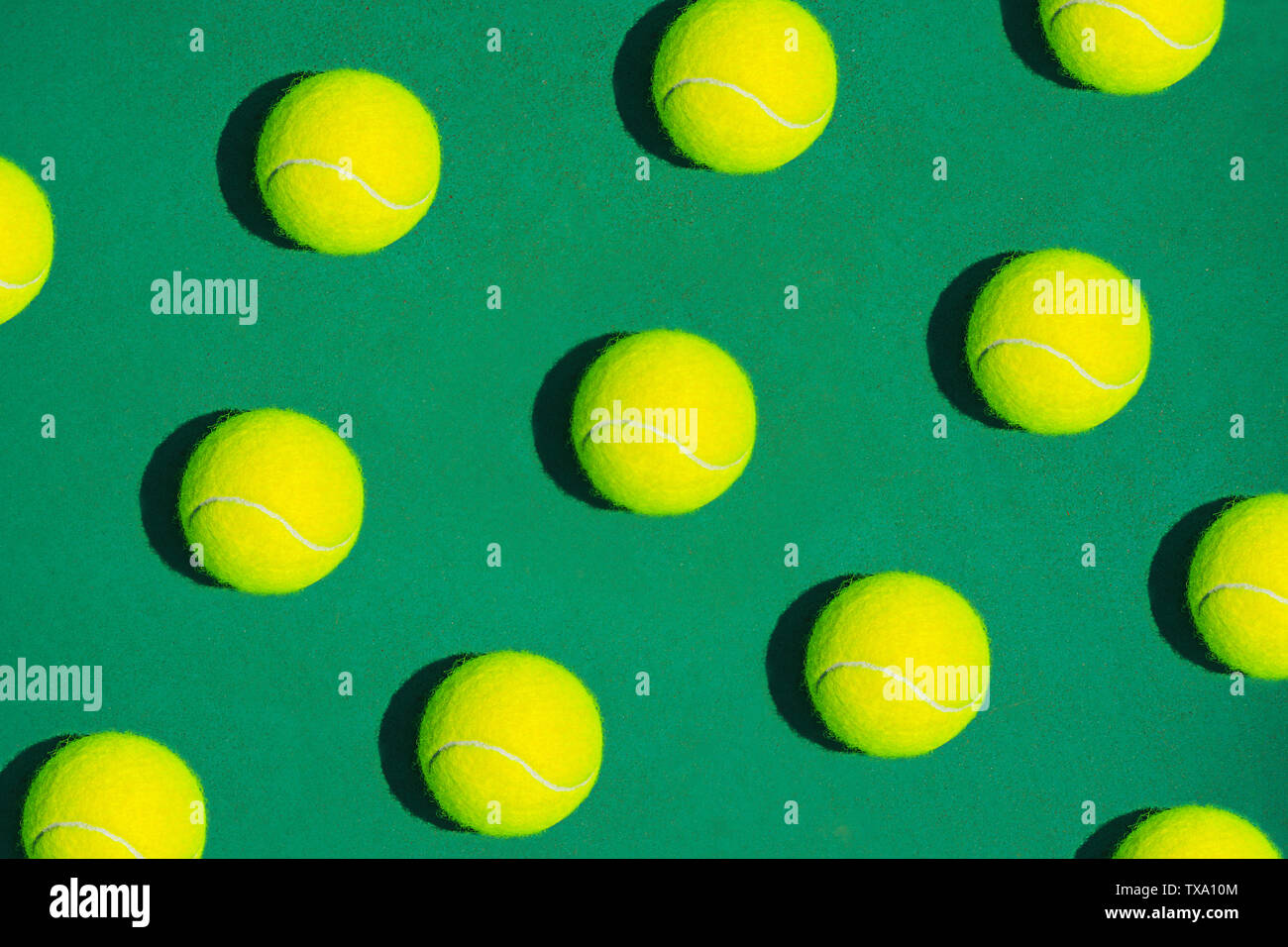 Creative composition made with tennis ball on green background Stock ...