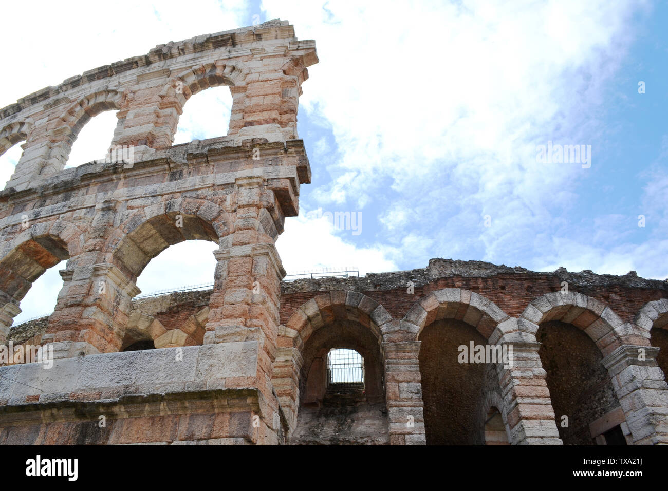 Close-up view to ruins of external walls of Arena di Verona, the famous ...
