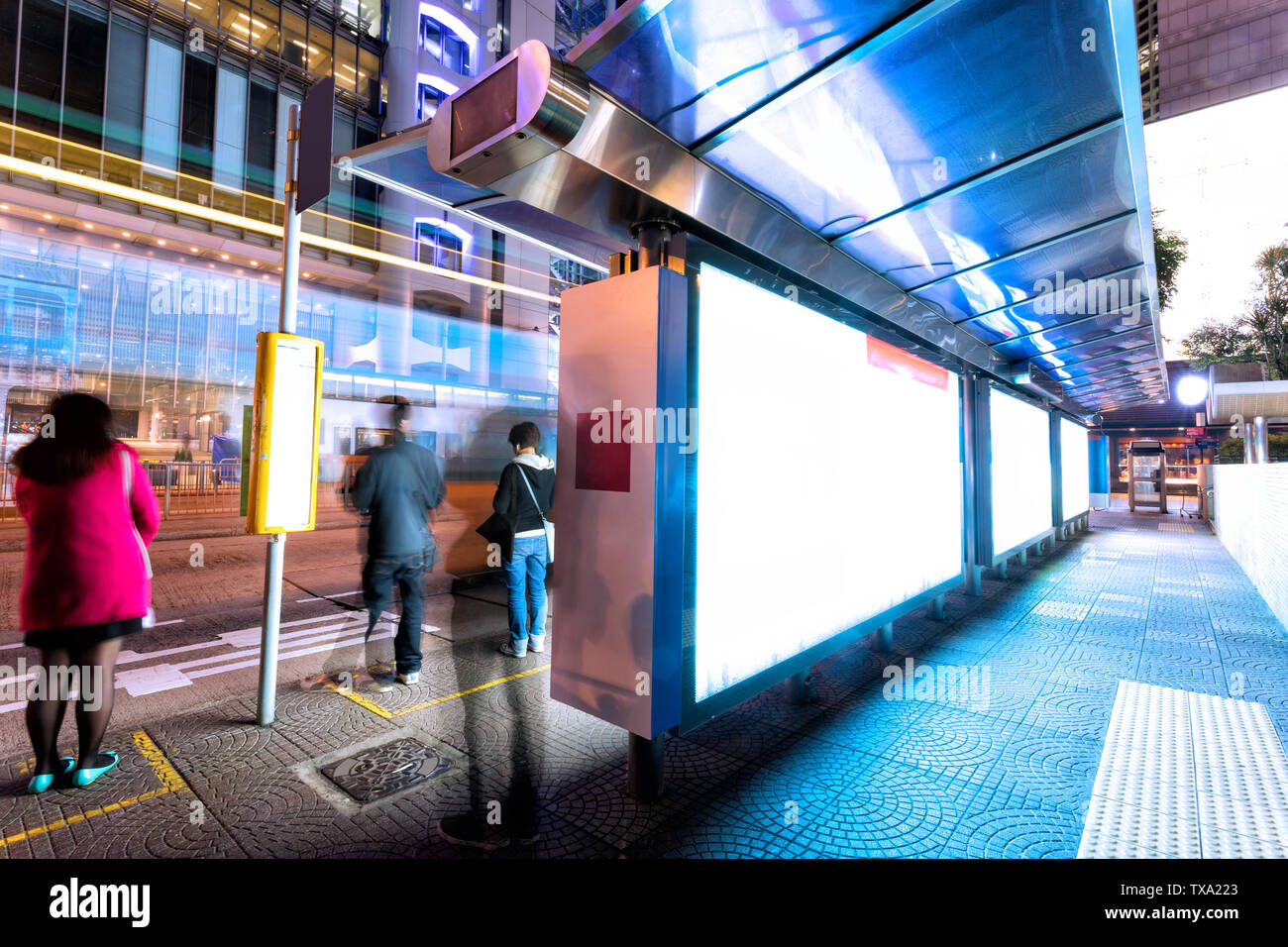 Traffic light trails bus stop Stock Photo - Alamy