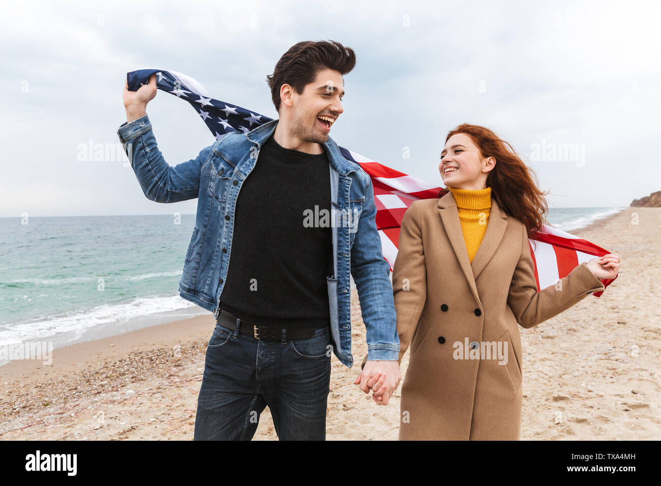 Man carrying american flag hi-res stock photography and images - Alamy
