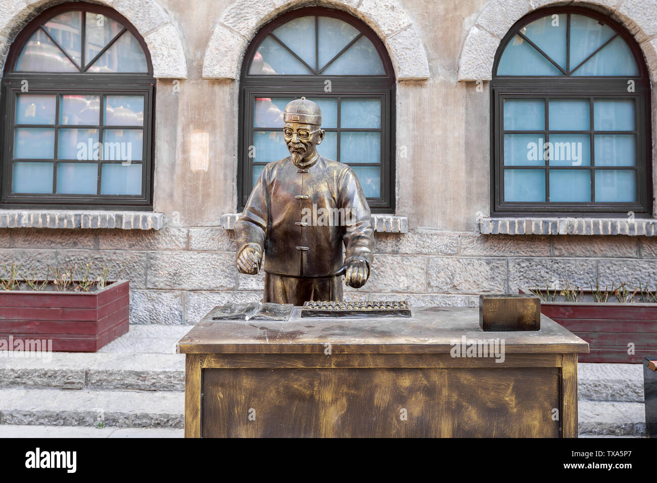 Folk sculptures on the streets of East Ah Gao City Stock Photo - Alamy