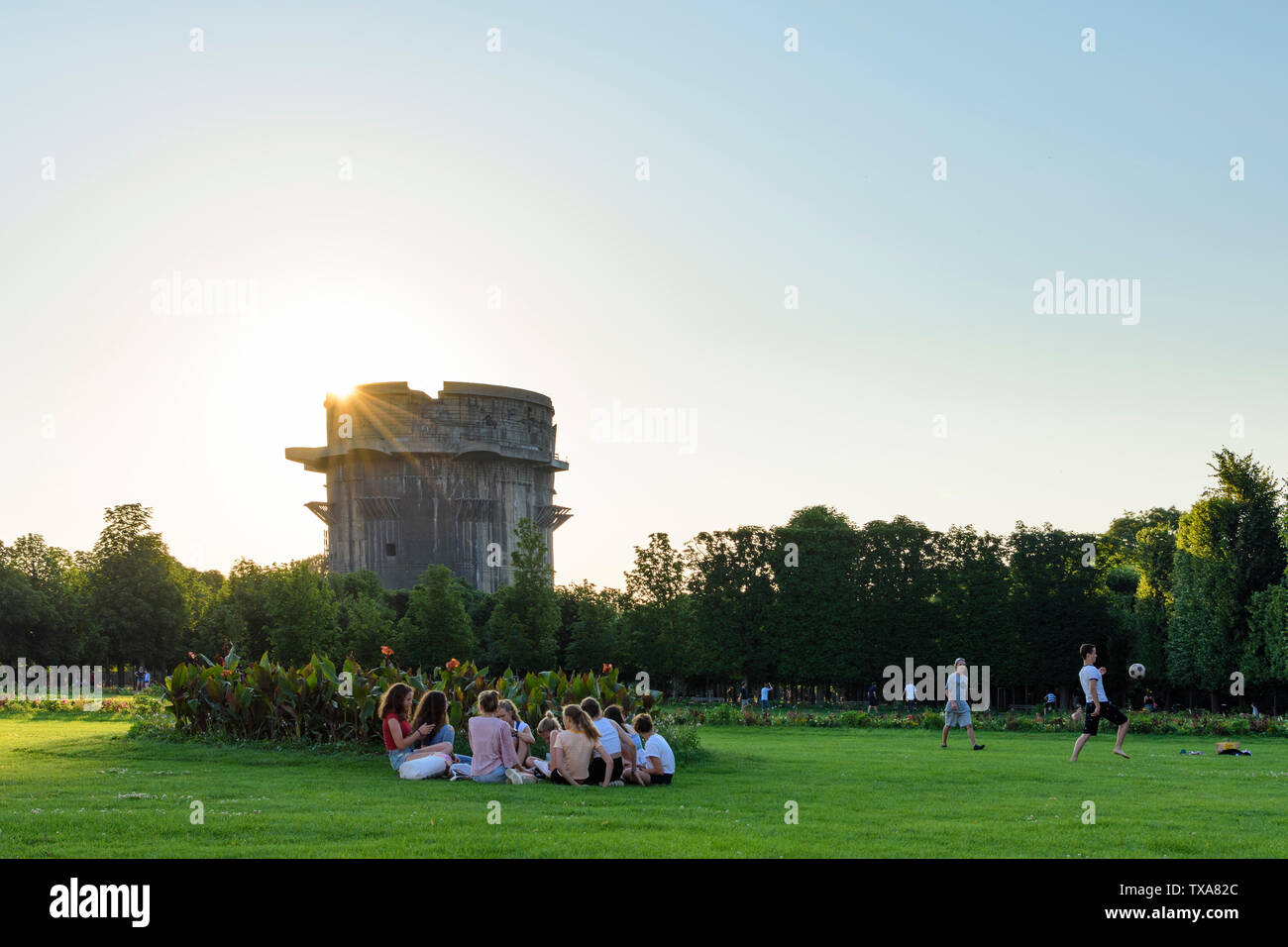 Wien, Vienna: park Augarten, flak antiaircraft gun tower, people ...