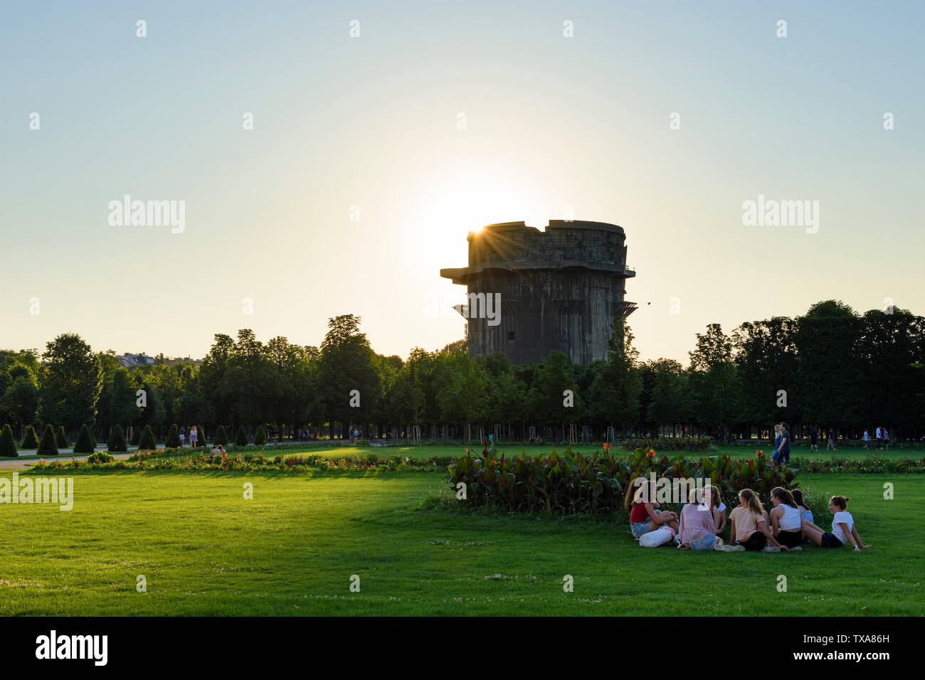 Wien, Vienna: park Augarten, flak antiaircraft gun tower, people ...
