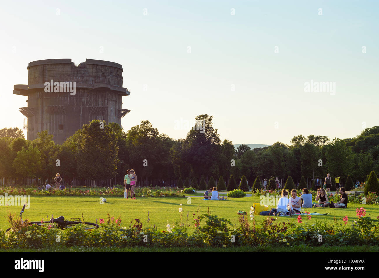Wien, Vienna: park Augarten, flak antiaircraft gun tower, people ...