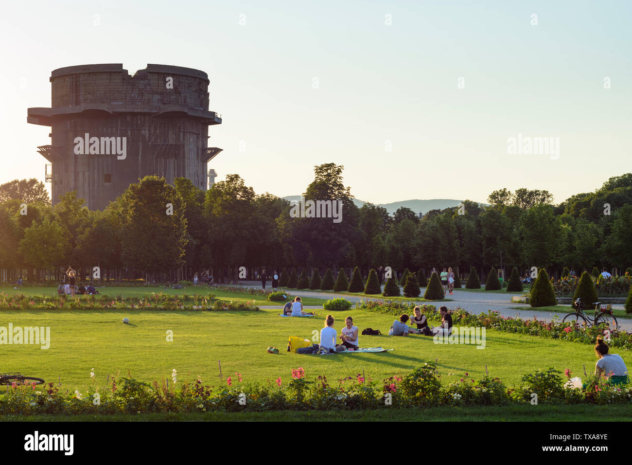 Wien, Vienna: park Augarten, flak antiaircraft gun tower, people ...