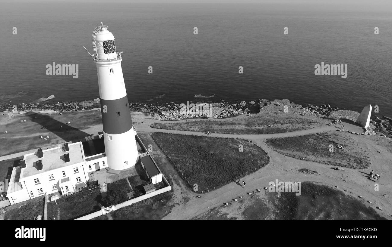Tall lighthouse on sea Black and White Stock Photos & Images - Alamy