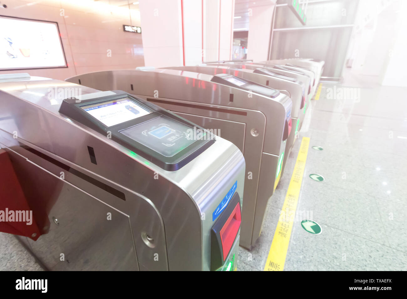 MTR entrance and exit gates Stock Photo - Alamy