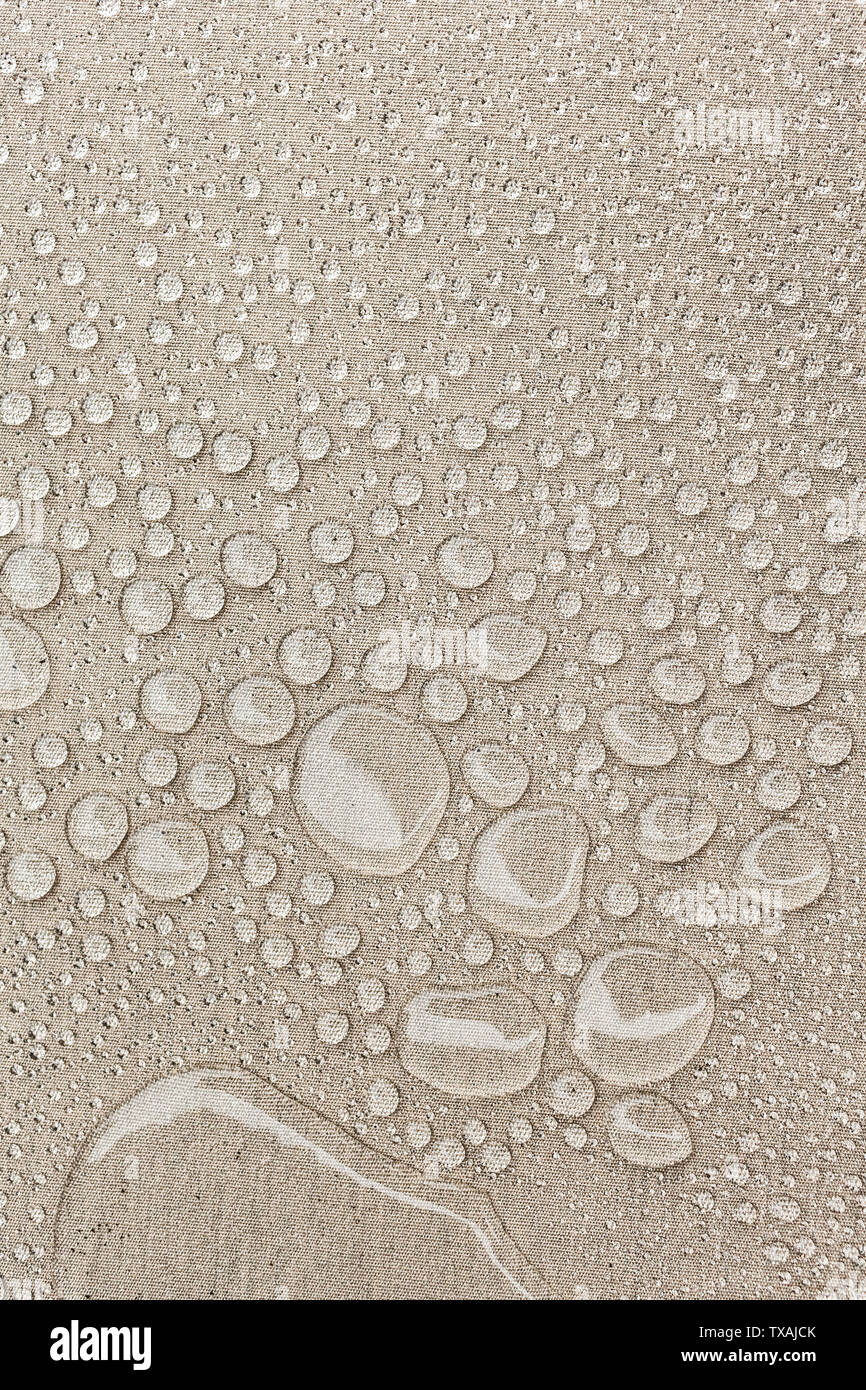 Texture of water drops on fabric textile close-up. Rain background ...