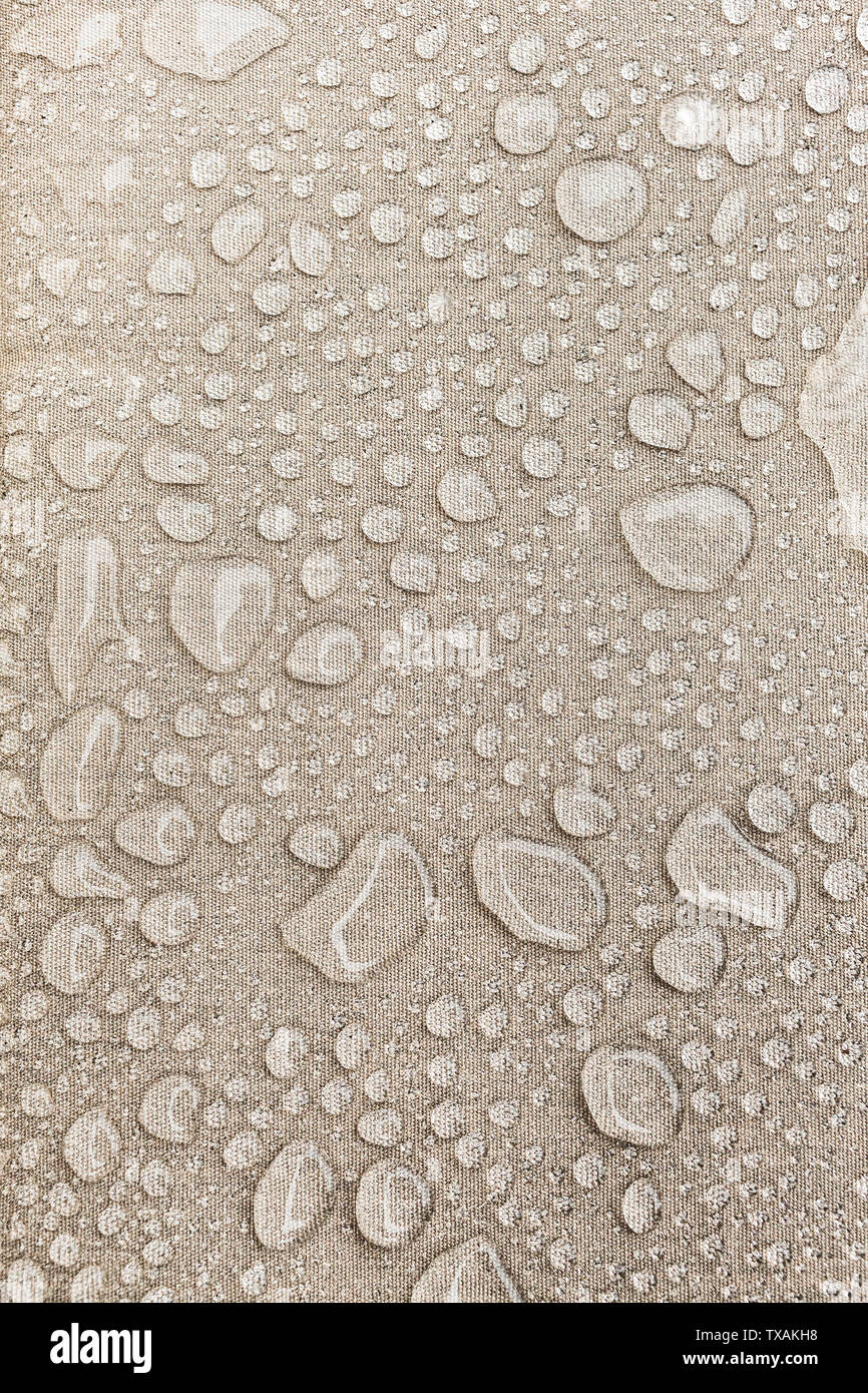 Texture of water drops on fabric textile close-up. Rain background ...