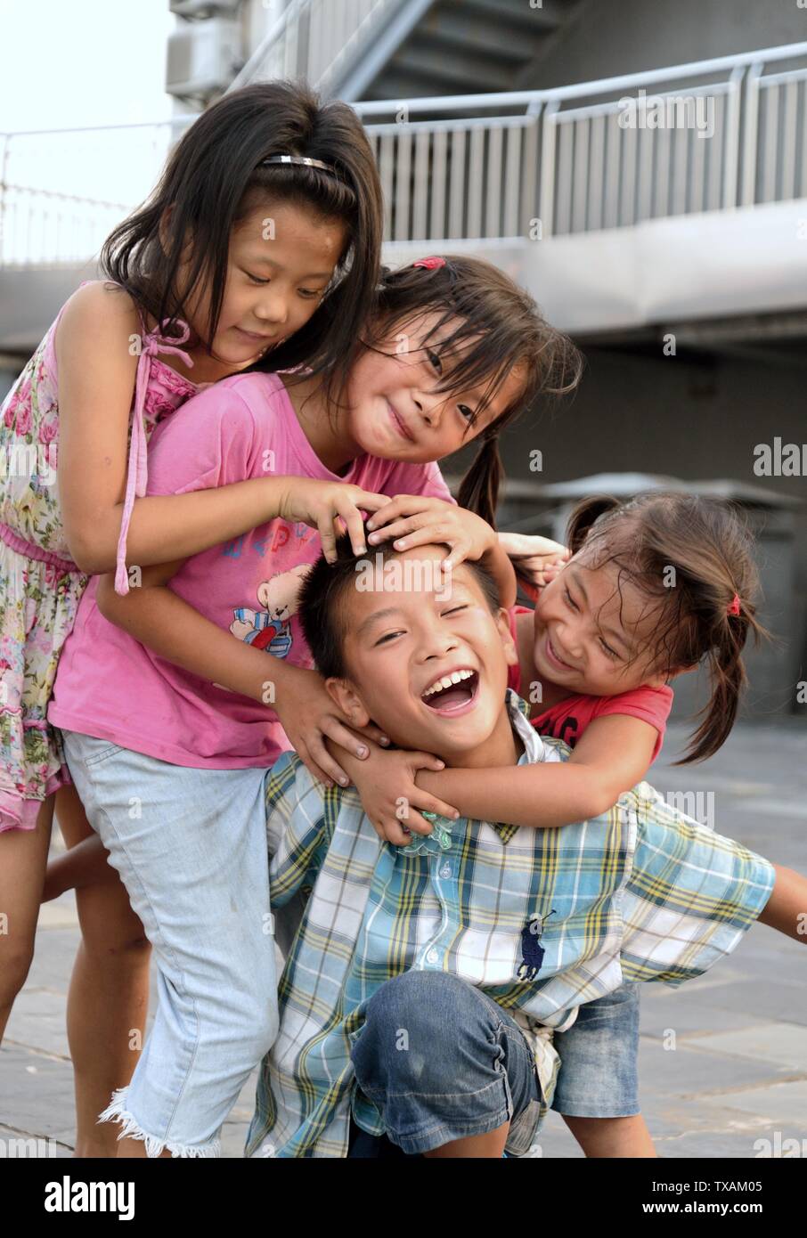 Happy, playful kids Stock Photo - Alamy