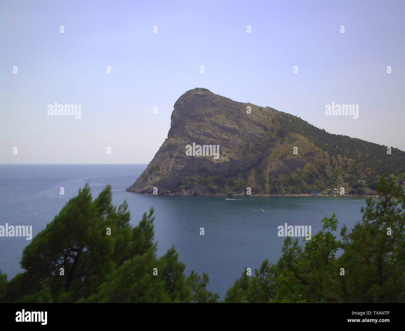 Bright, summer seascape with the rocky Black Sea coast in the Crimea ...