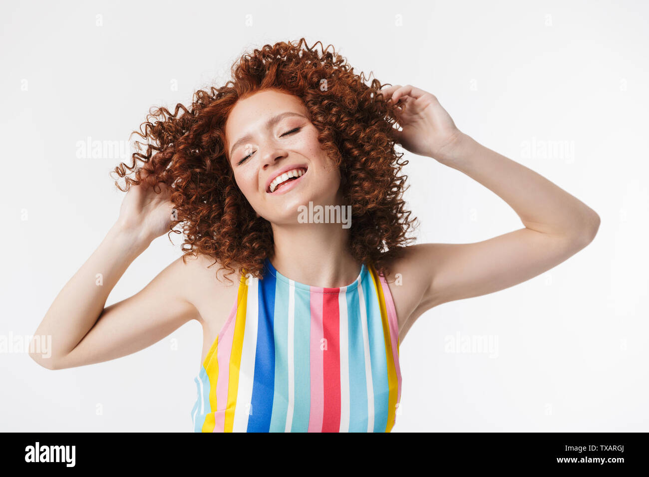 Portrait Of Beautiful Redhead Curly Woman 20s Wearing Colorful Dress