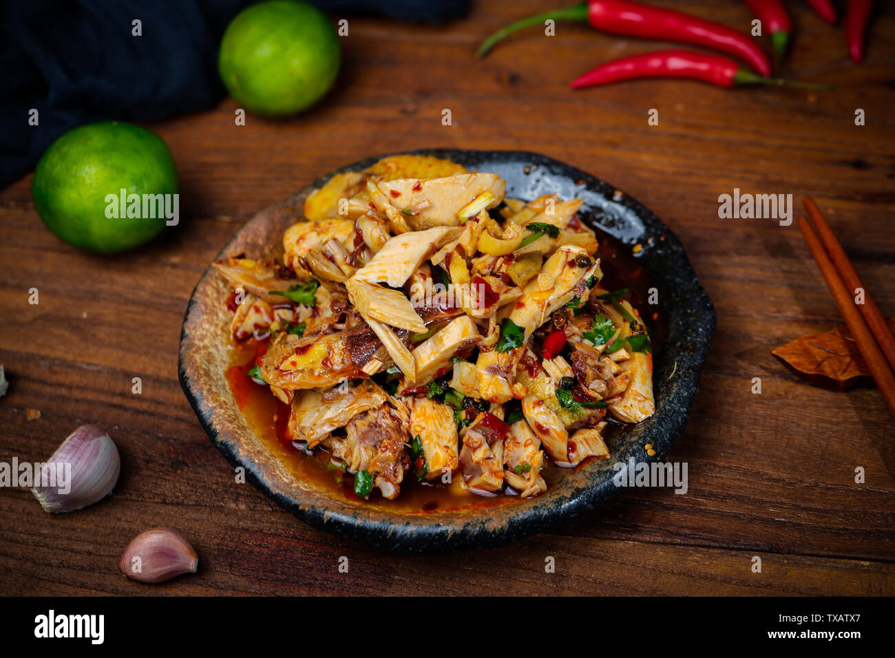 drooling chicken, stick chicken Stock Photo - Alamy