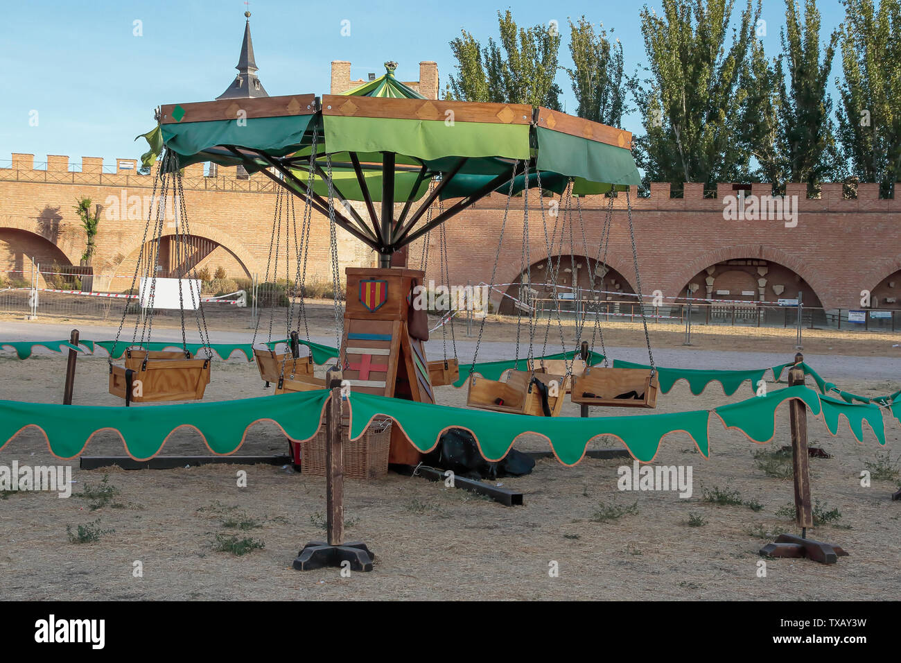 ancient wooden carousel in a medieval festival celebrated in alcala de ...
