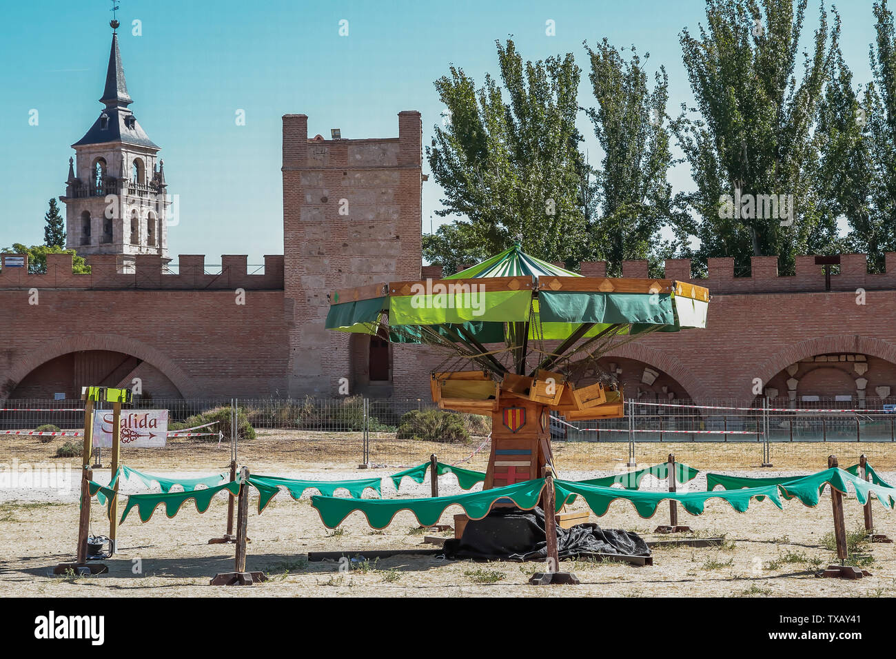 ancient wooden carousel in a medieval festival celebrated in alcala de ...