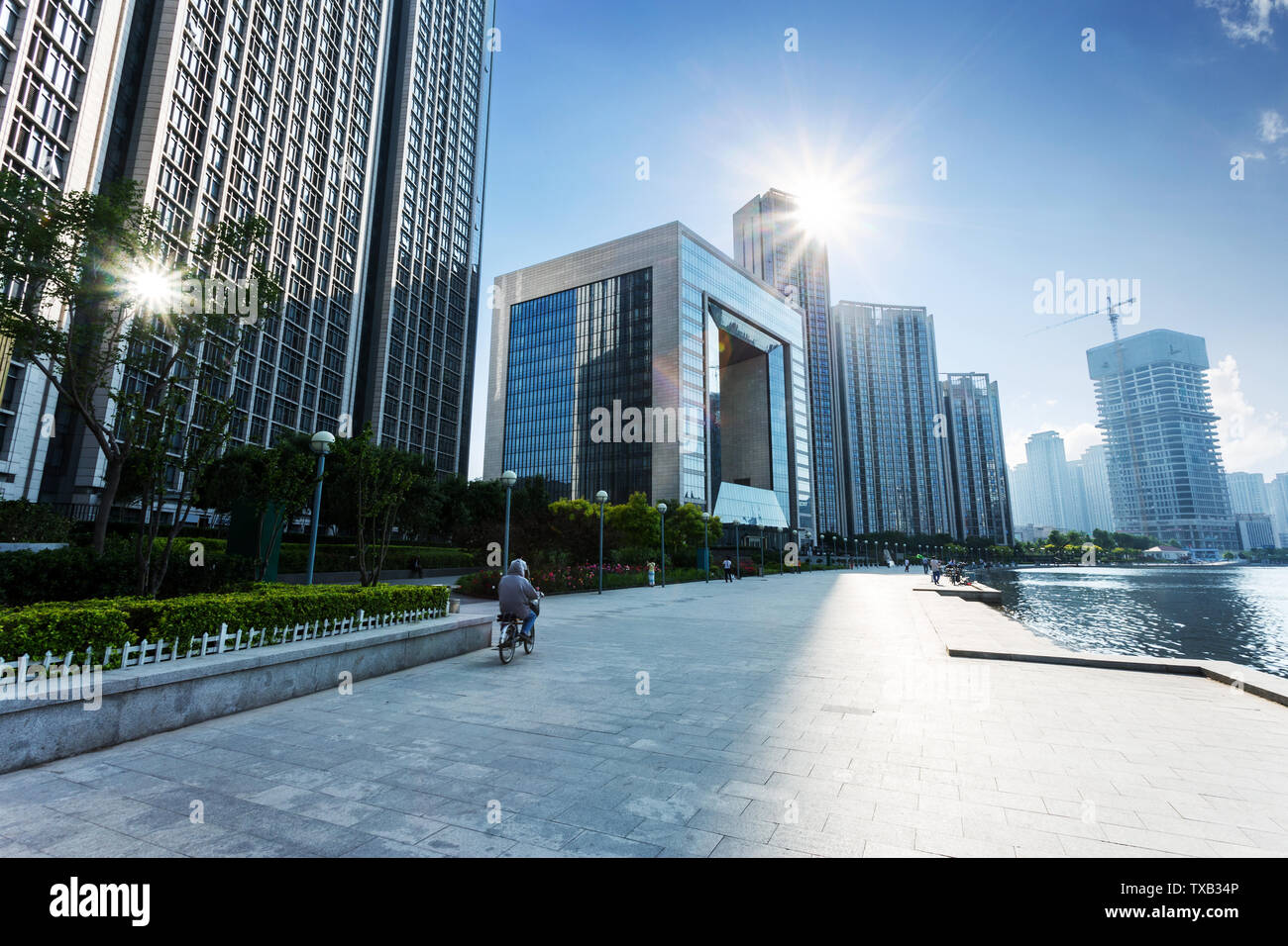 modern building exterior with brick road floor at riverbank Stock Photo ...