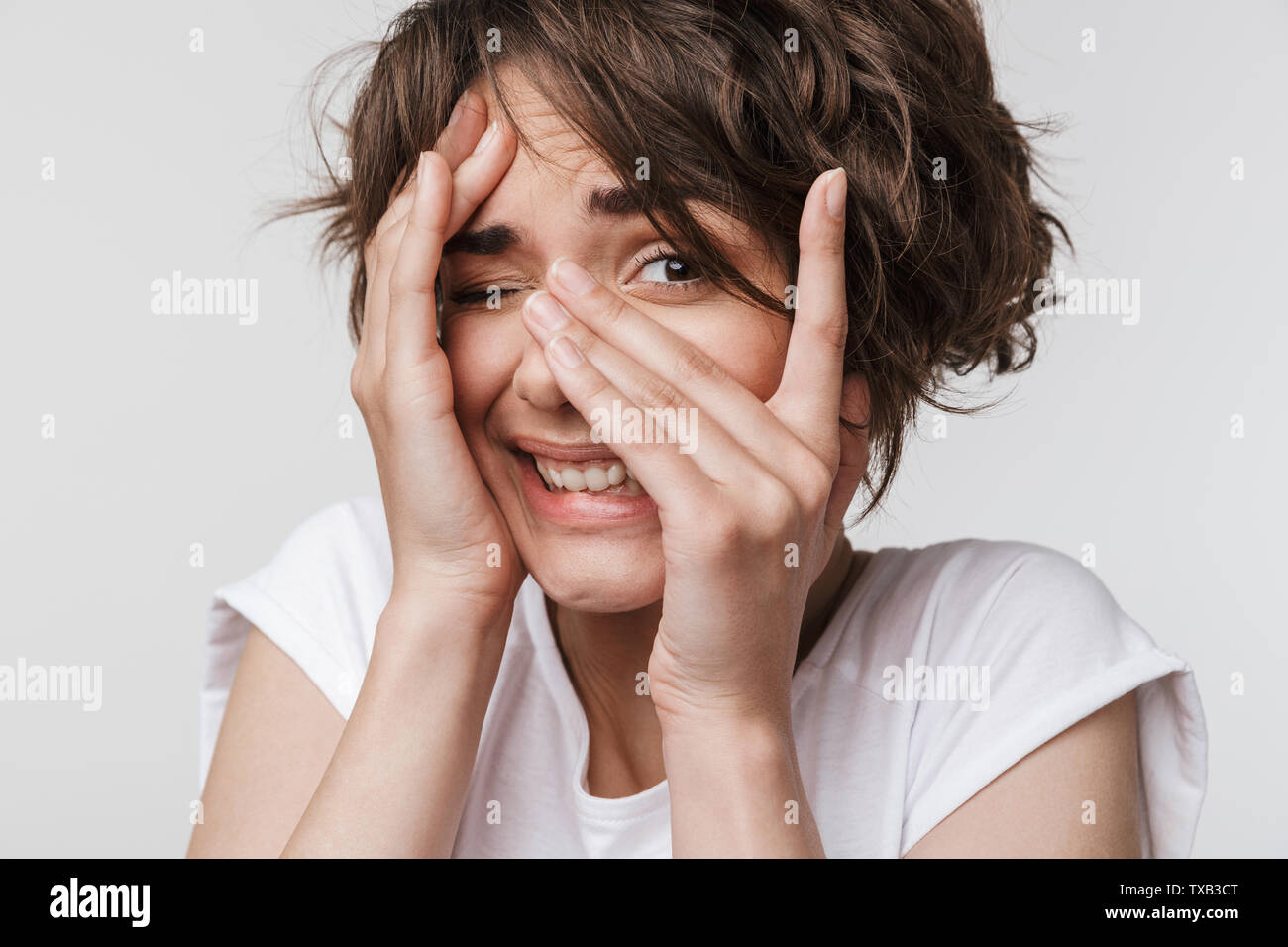 Image of a beautiful young pretty scared woman posing isolated over ...