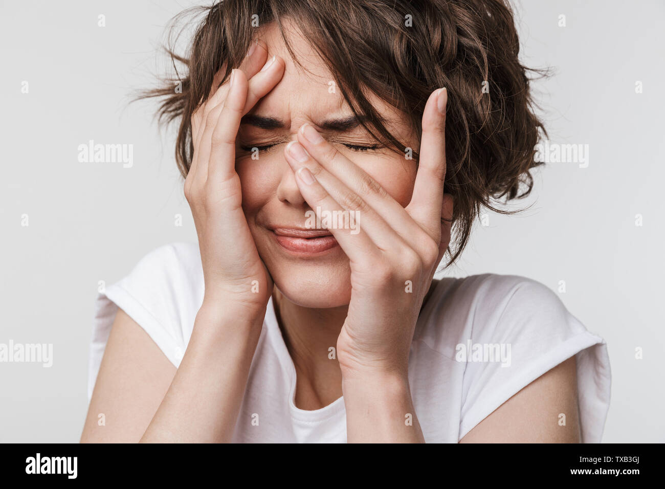 Image of a beautiful young pretty scared woman posing isolated over ...