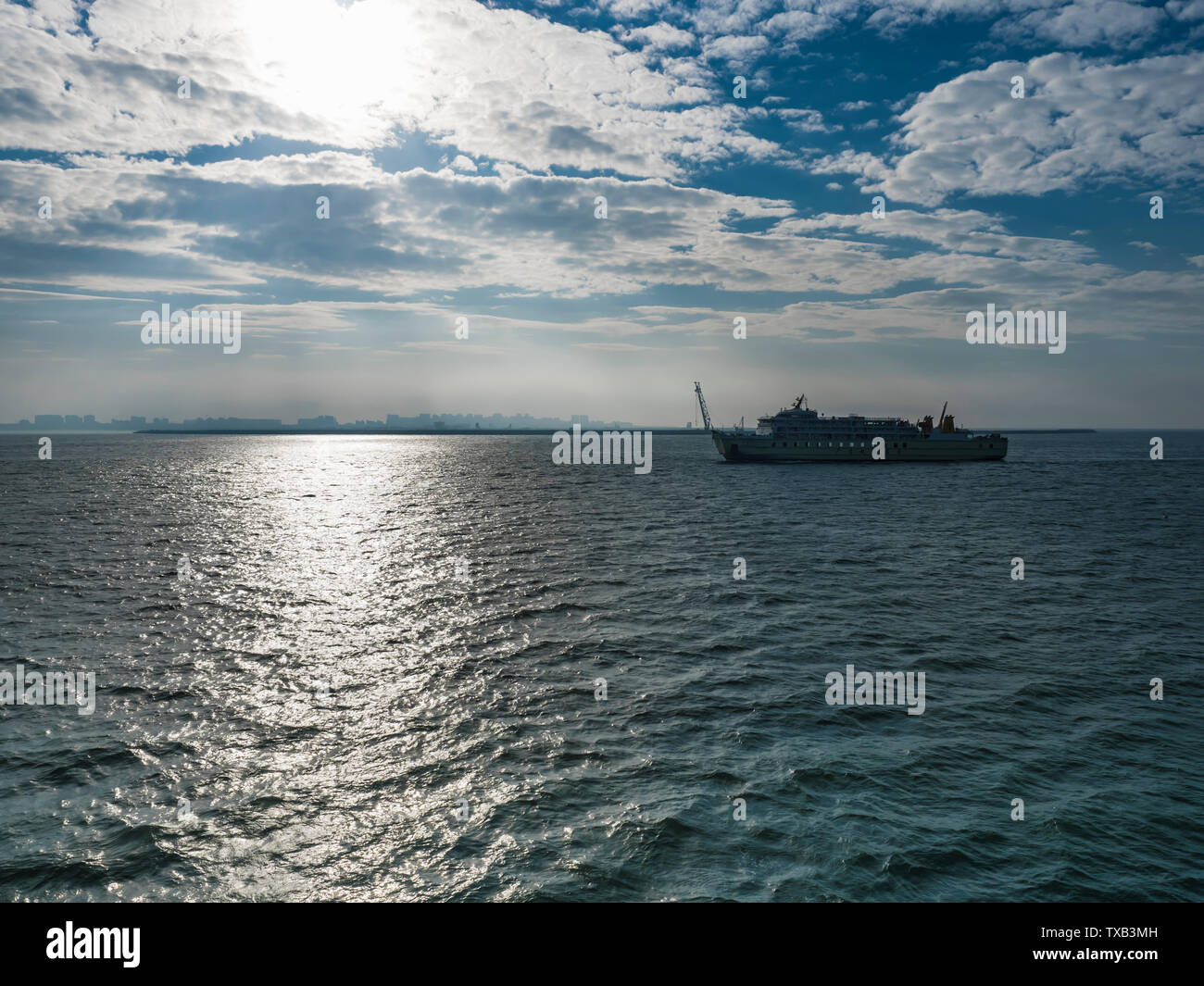 Sunset sea level Stock Photo - Alamy