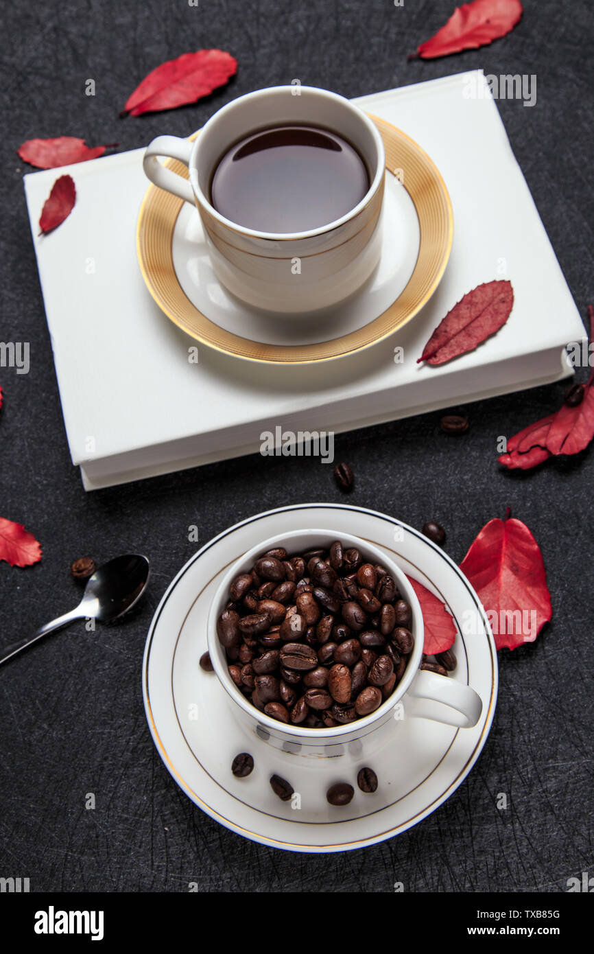 Intense coffee and coffee beans Stock Photo - Alamy