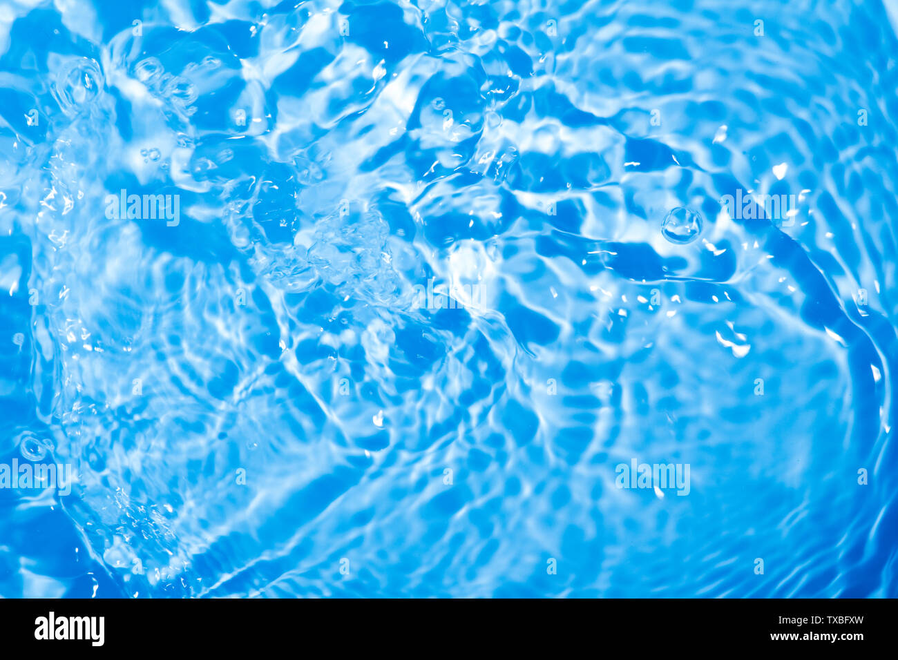 Crystal clear water ripples Stock Photo - Alamy