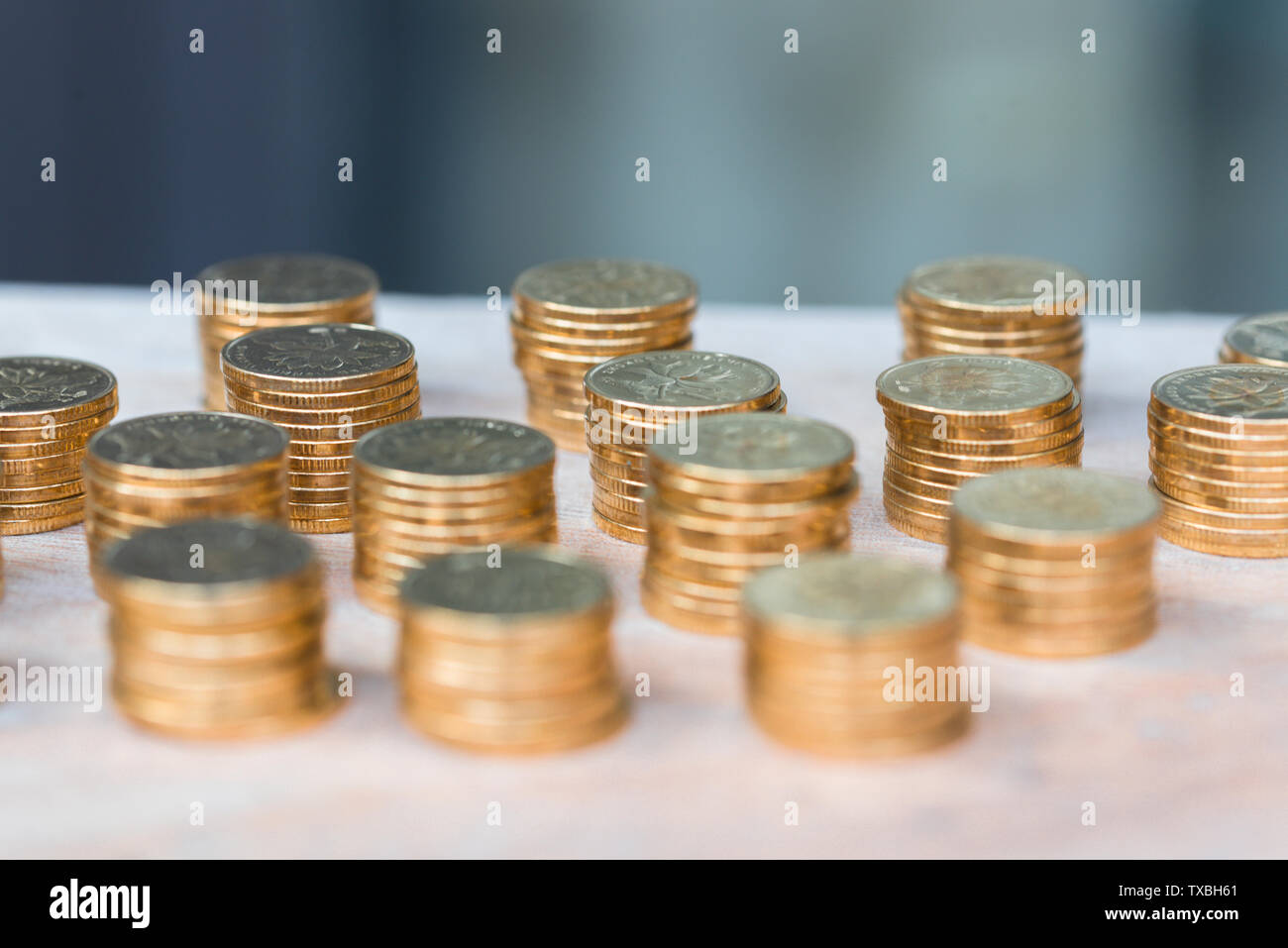 Stacked gold coins Stock Photo - Alamy