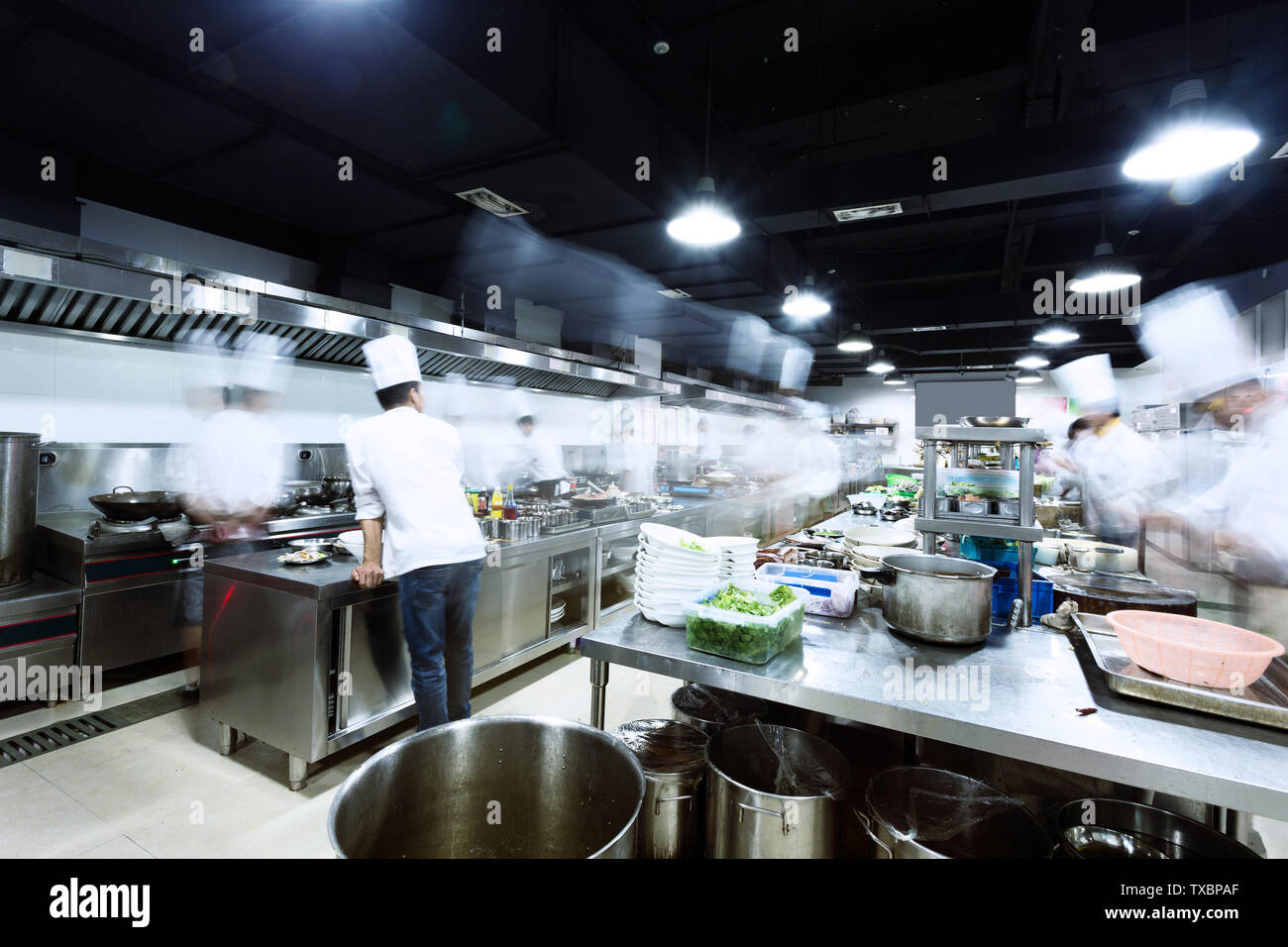 Modern and busy chefs Stock Photo - Alamy