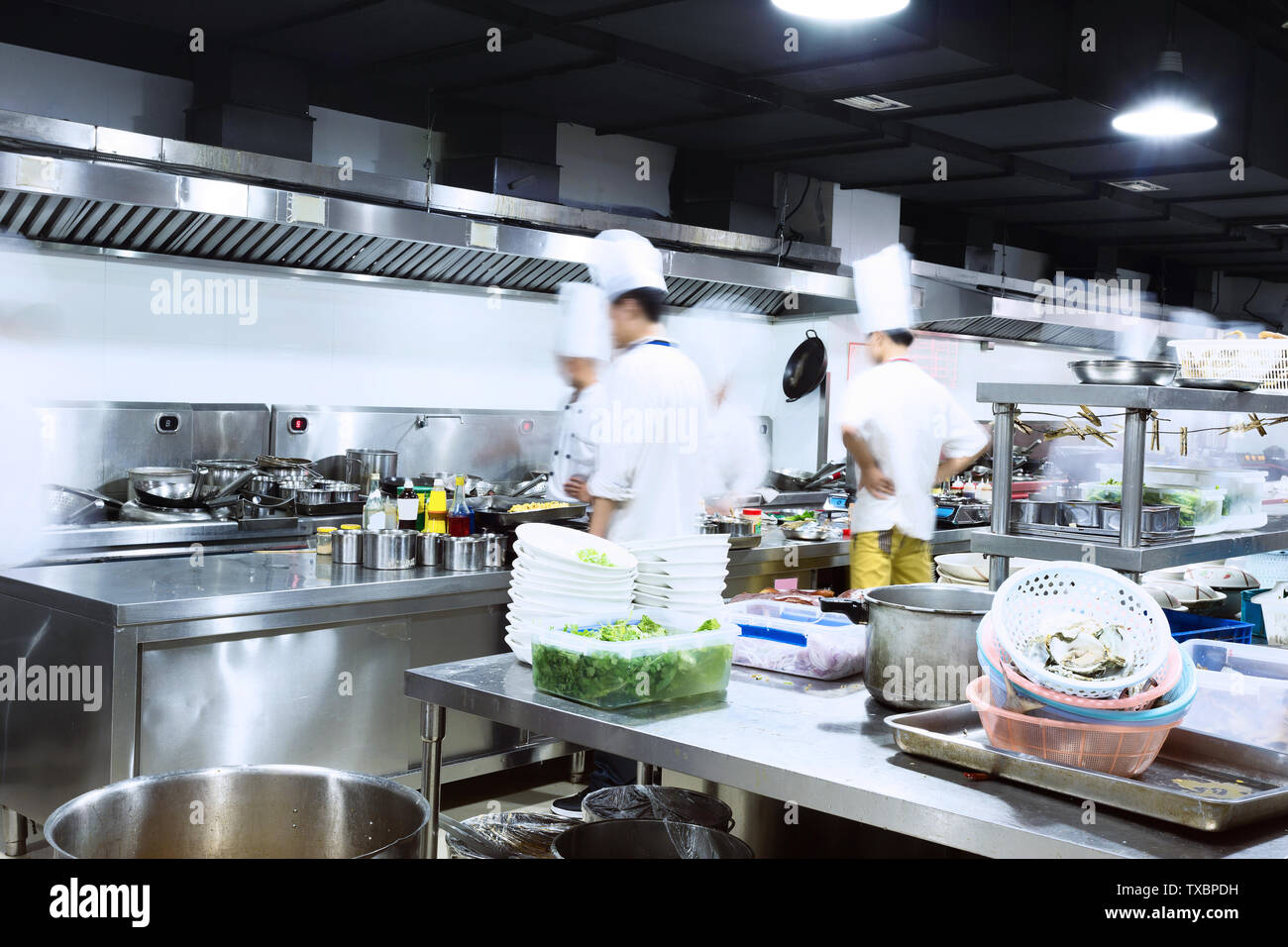 Modern and busy chefs Stock Photo - Alamy