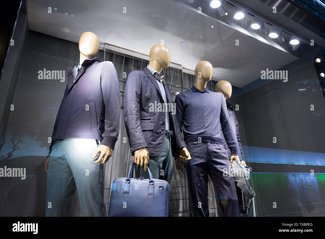 Fashion store mannequins in window Stock Photo - Alamy