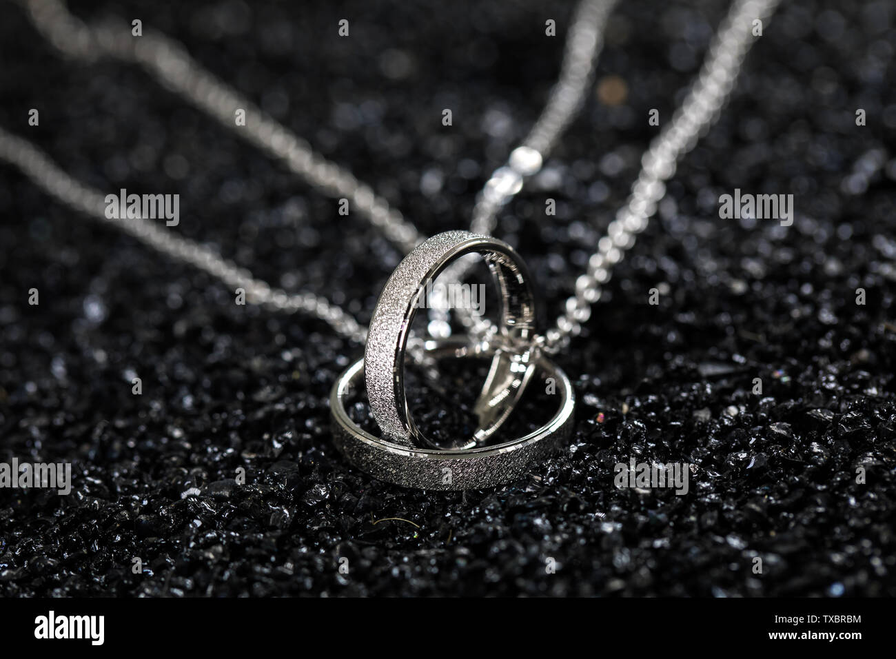 A silver ring, a symbol of love Stock Photo - Alamy