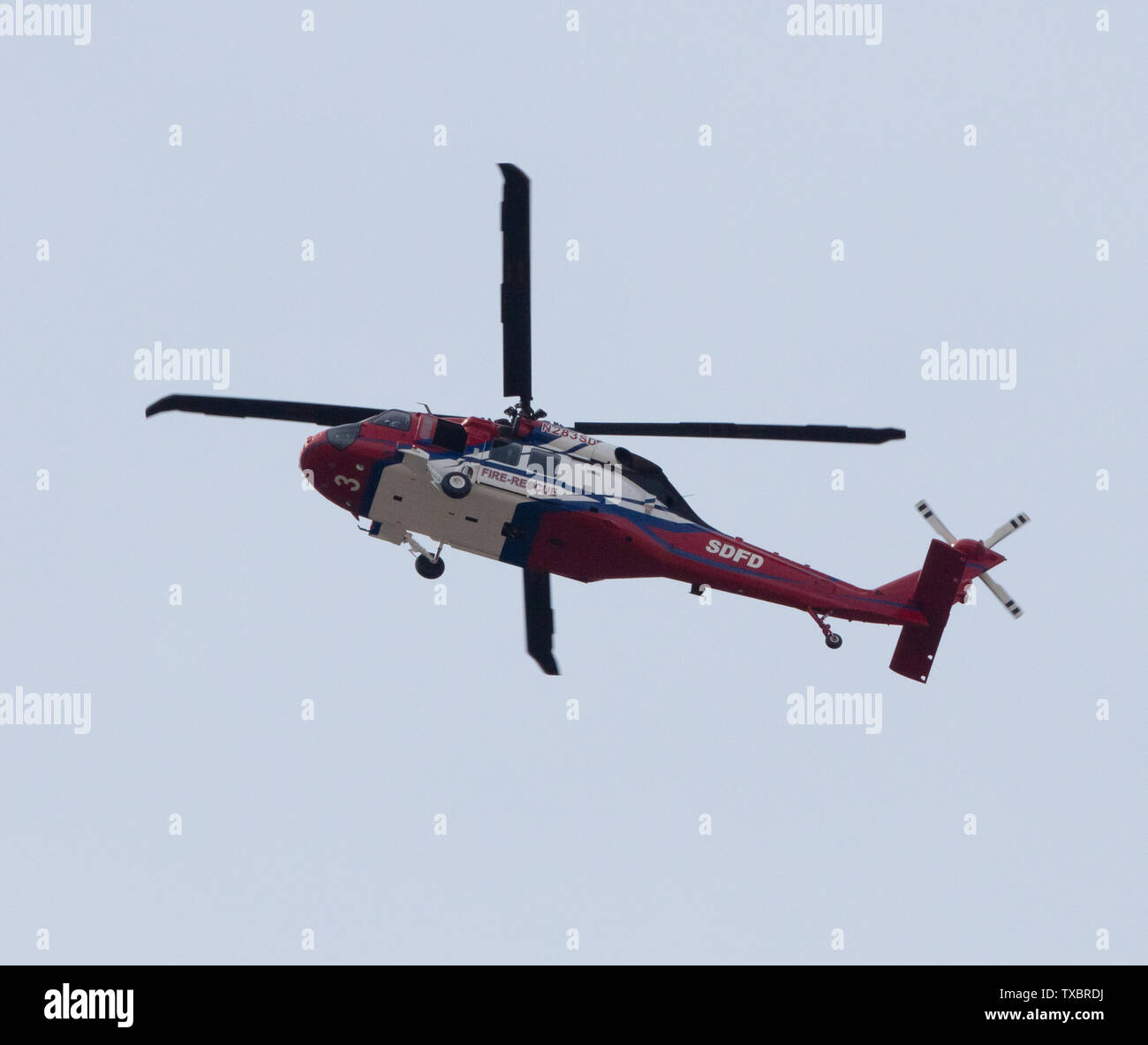 San Diego Fire Department Fire Rescue helicopter seen from below as it ...