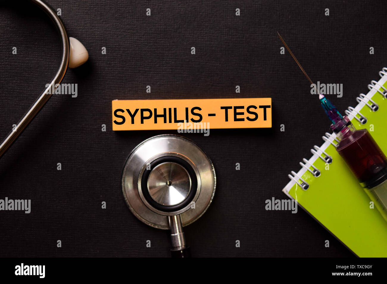 Syphilis - Test on top view black table with blood sample and ...