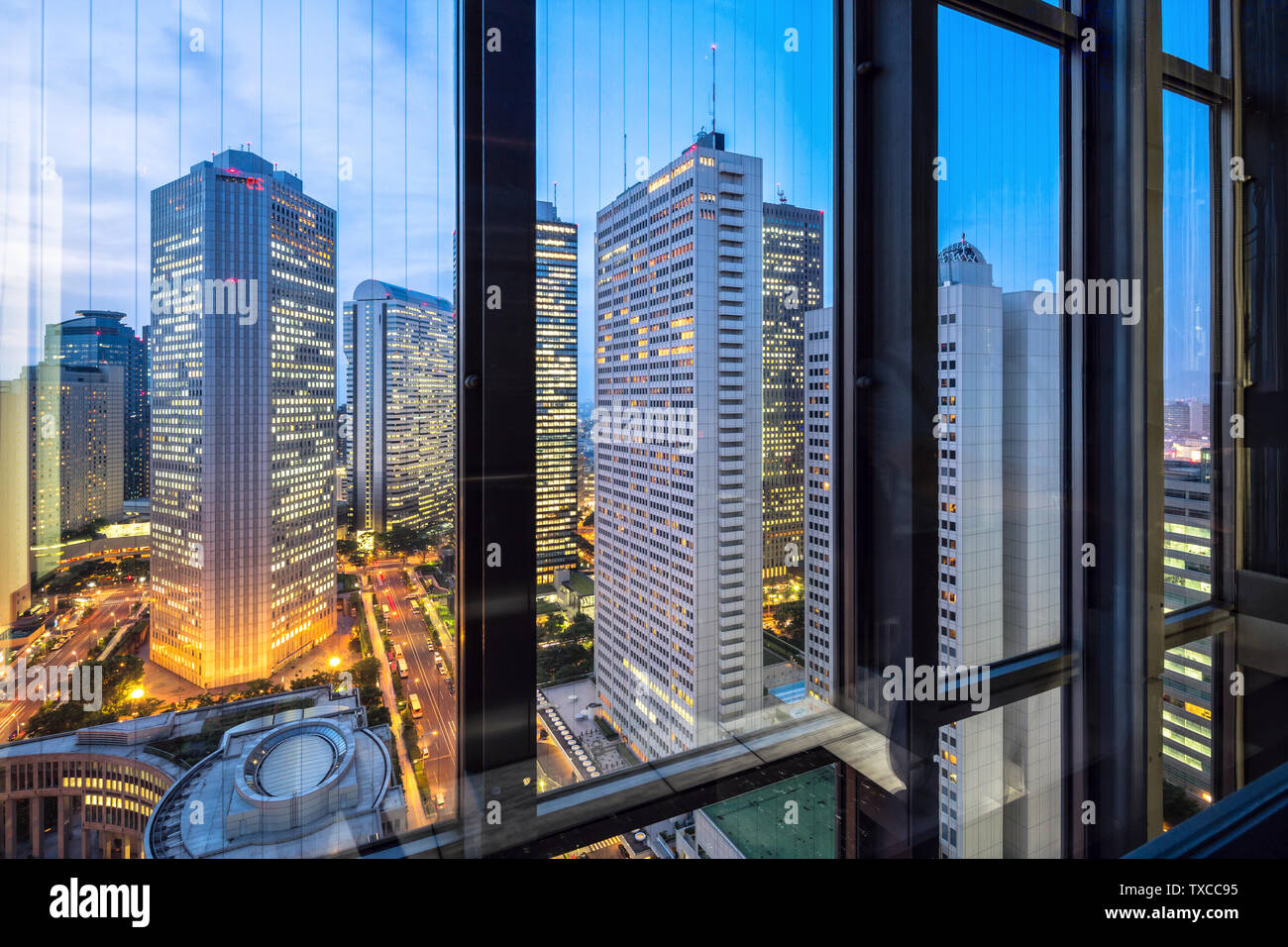 modern office buildings in tokyo through window Stock Photo - Alamy