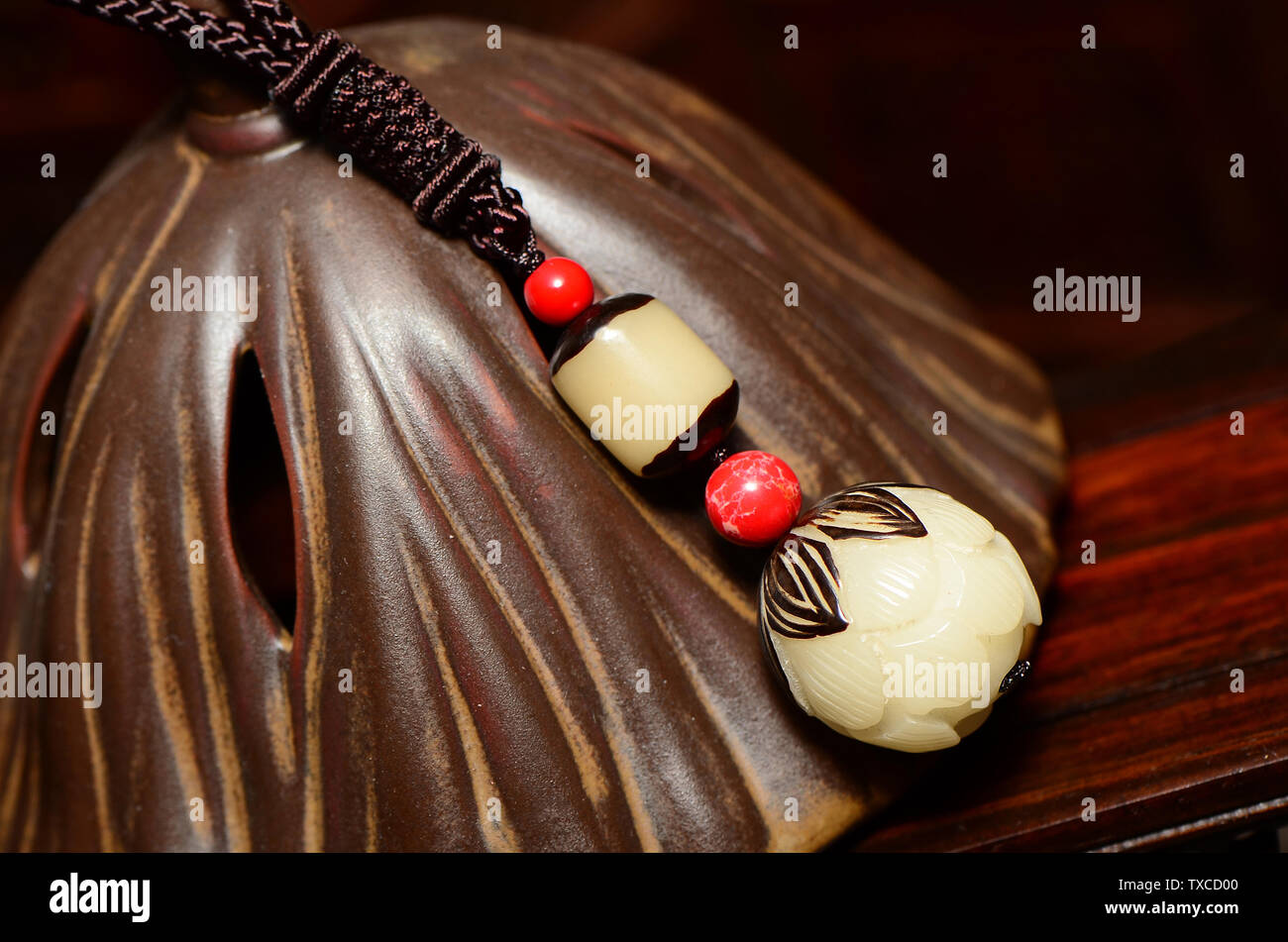 Bodhi pendant, necklace, wool chain Stock Photo - Alamy