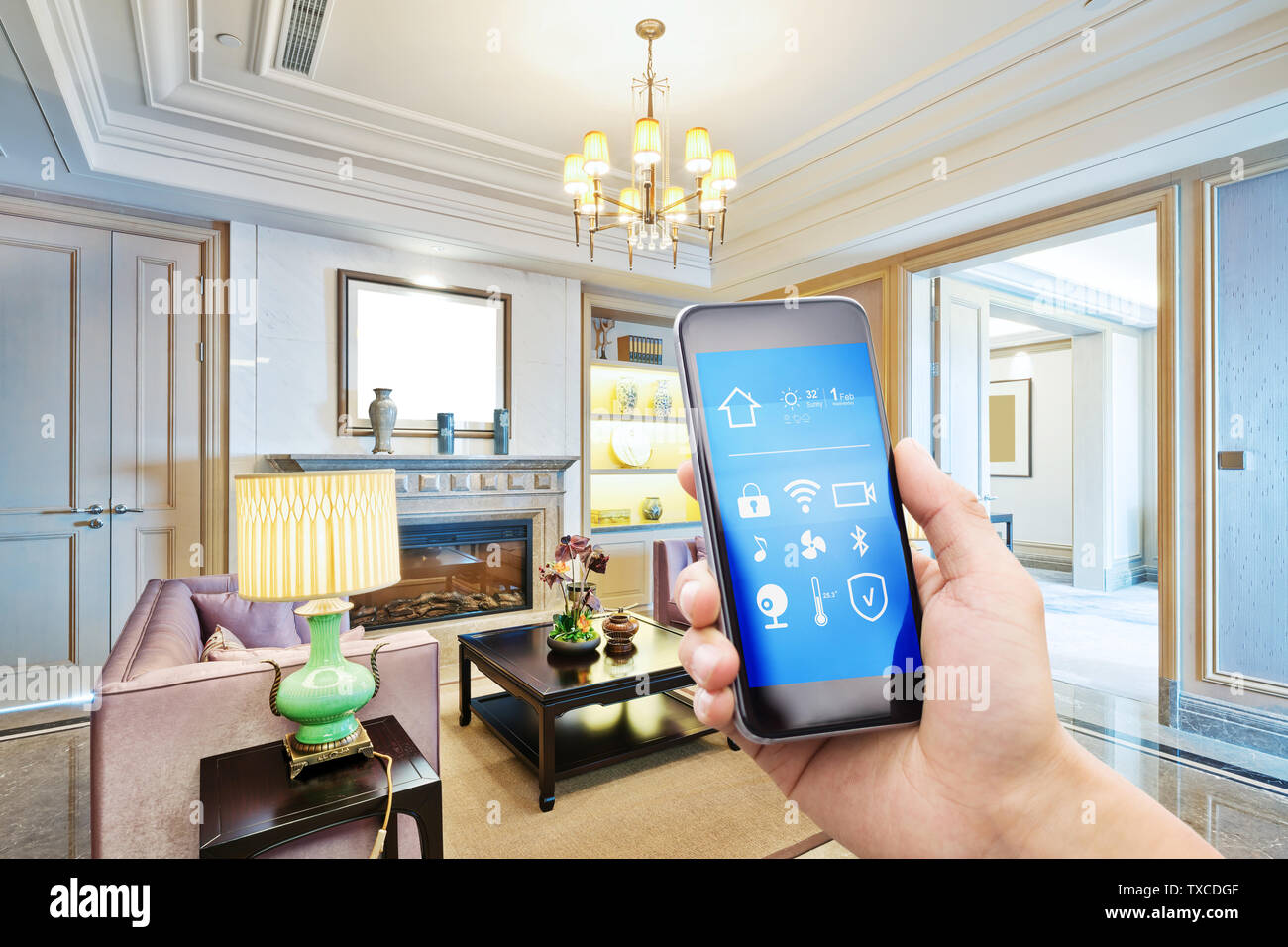 Mobile phone in smart home Stock Photo - Alamy