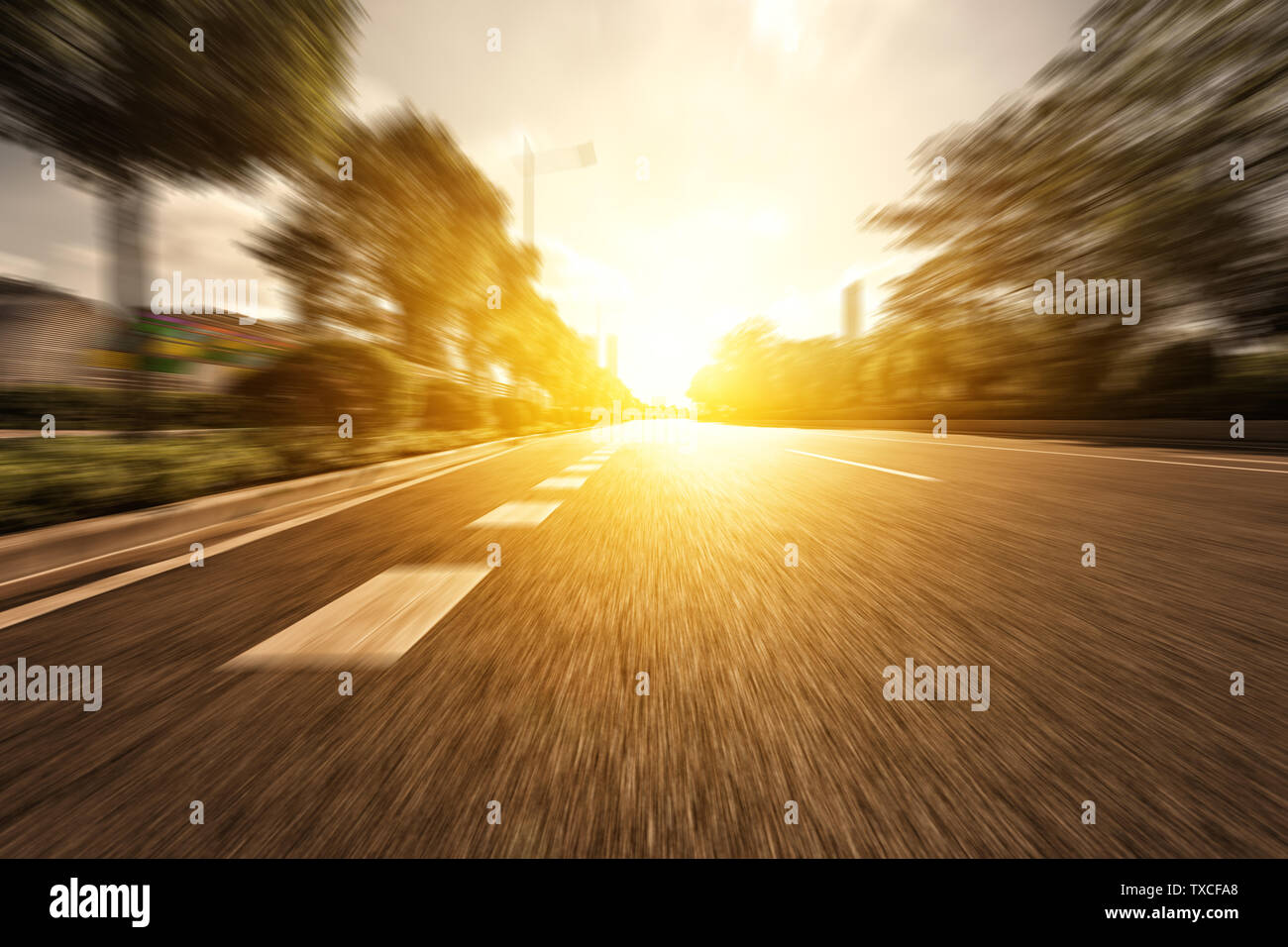 Empty asphalt road under sunshine Stock Photo - Alamy